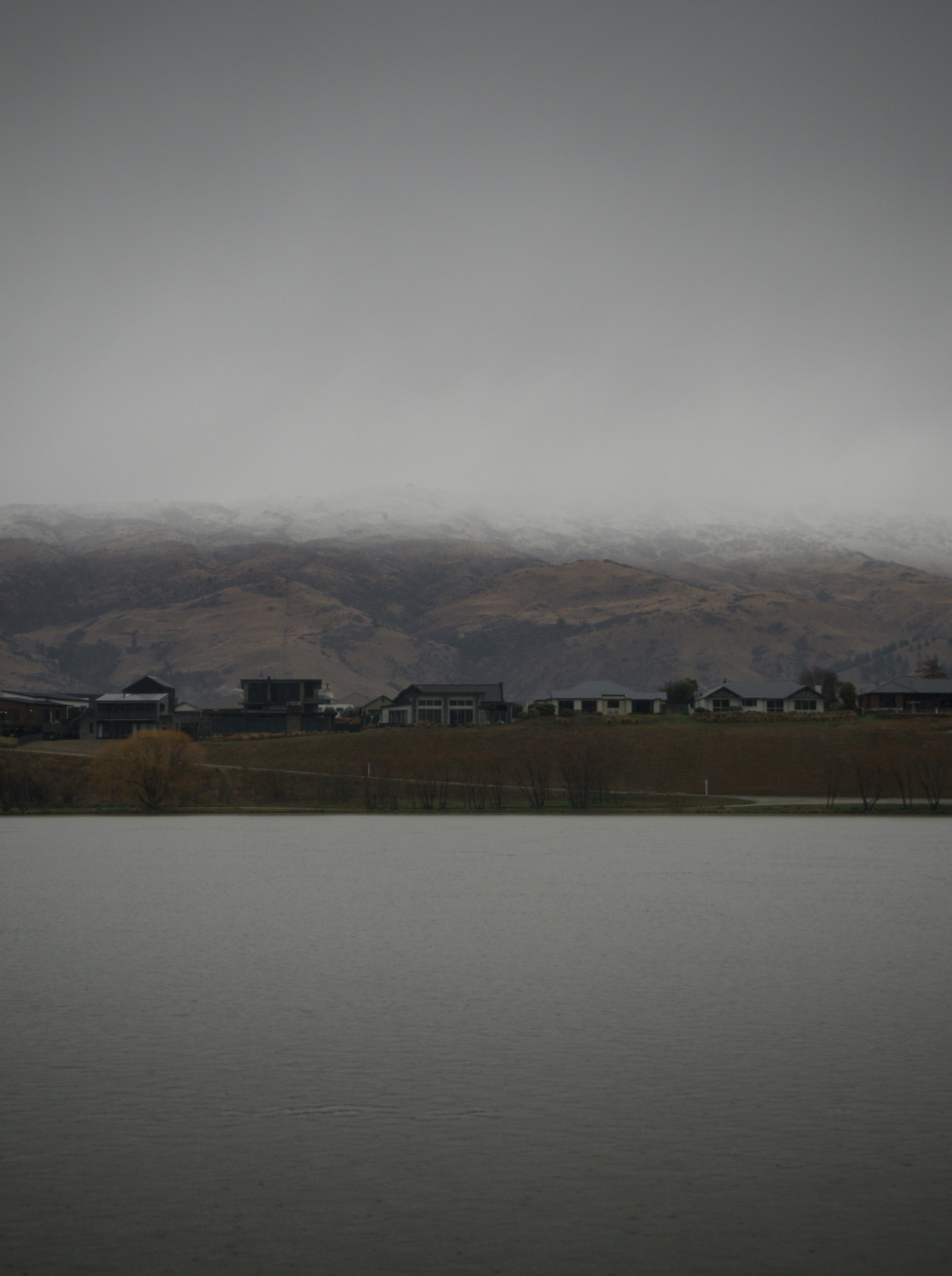 Clouds Over Quiet Lakefront Village