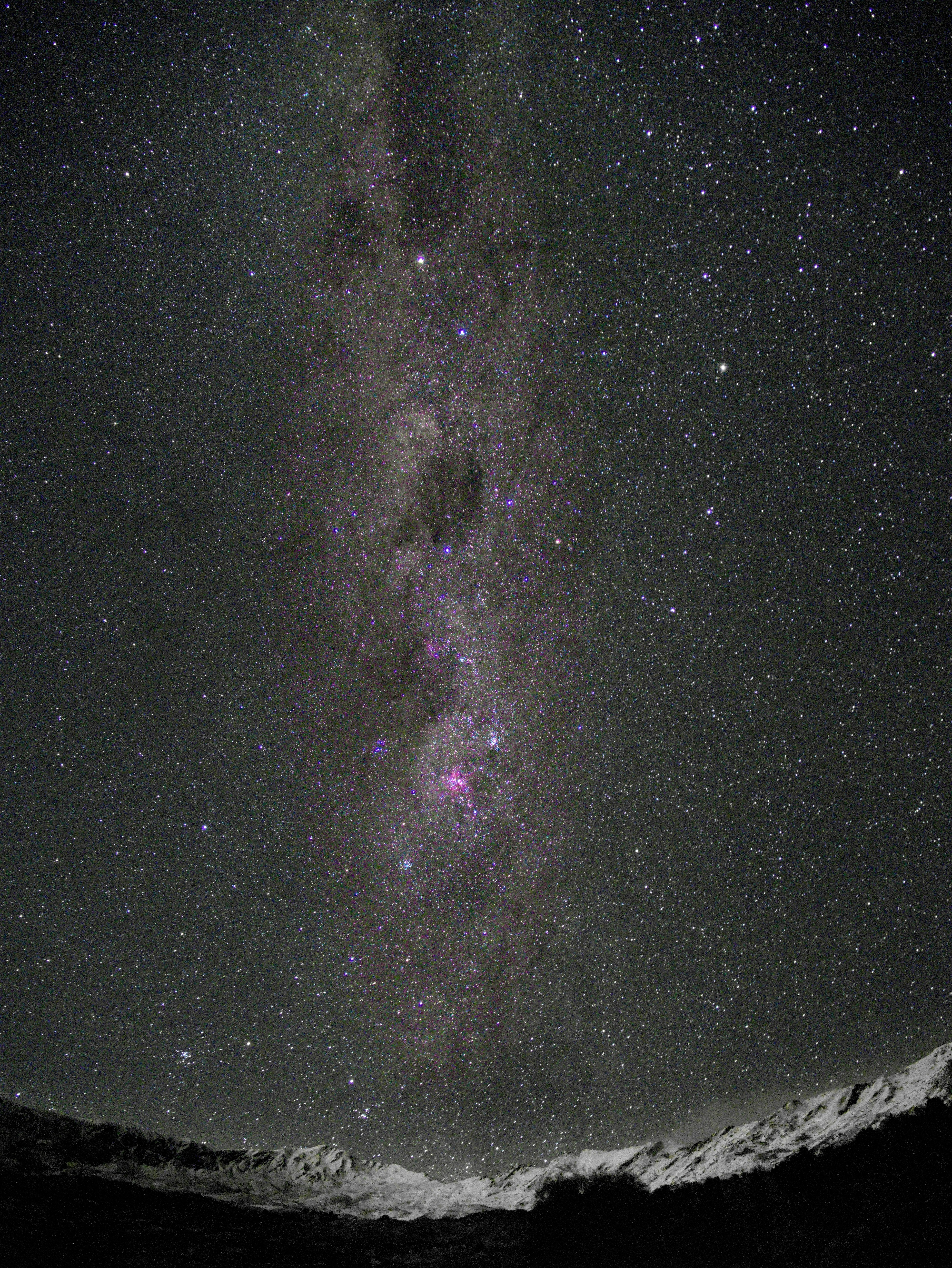 Milky Way Arc Over Snow-Capped Rim