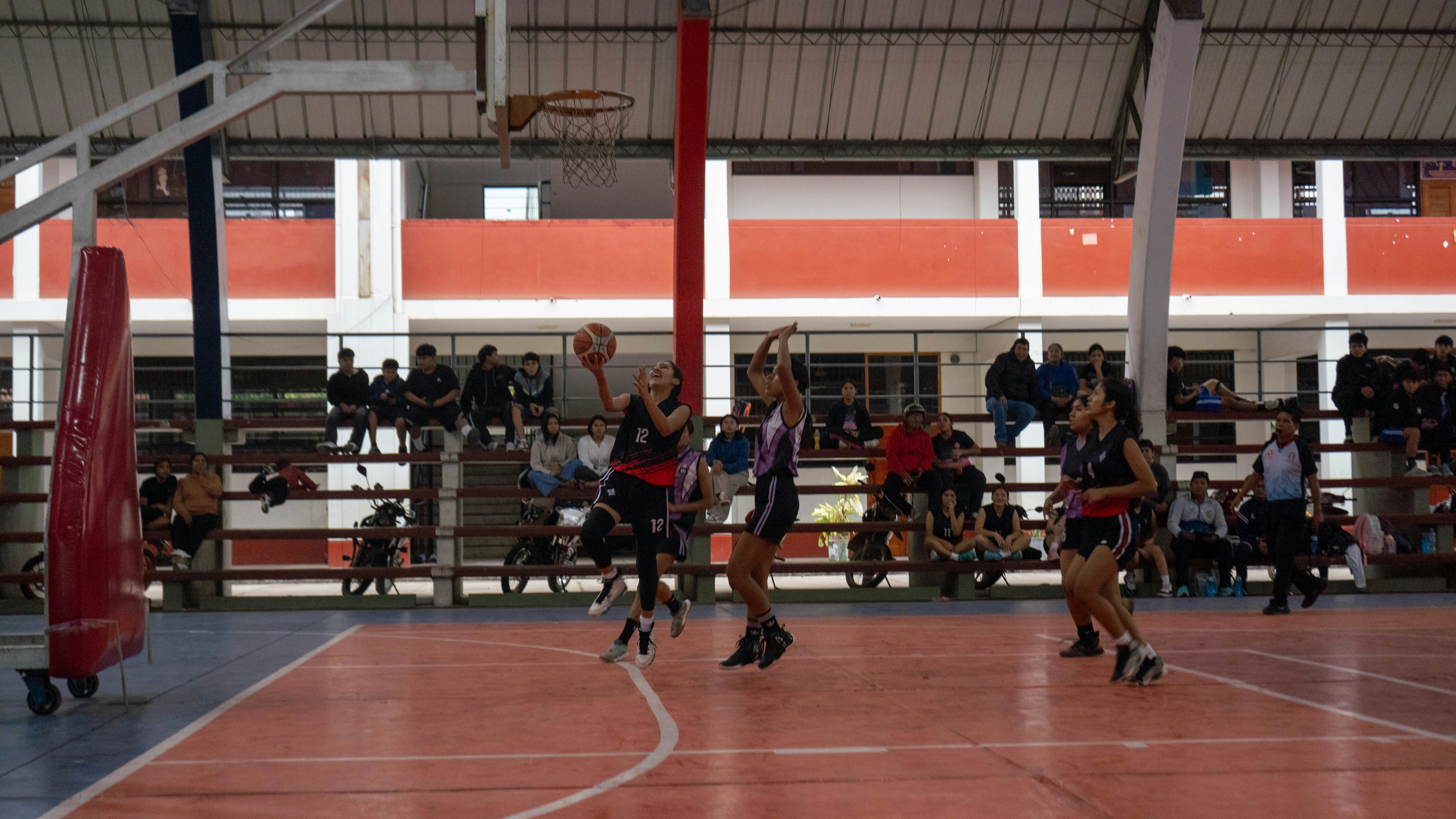 Jump Shot in a School Gym: Fiber of Team Spirit