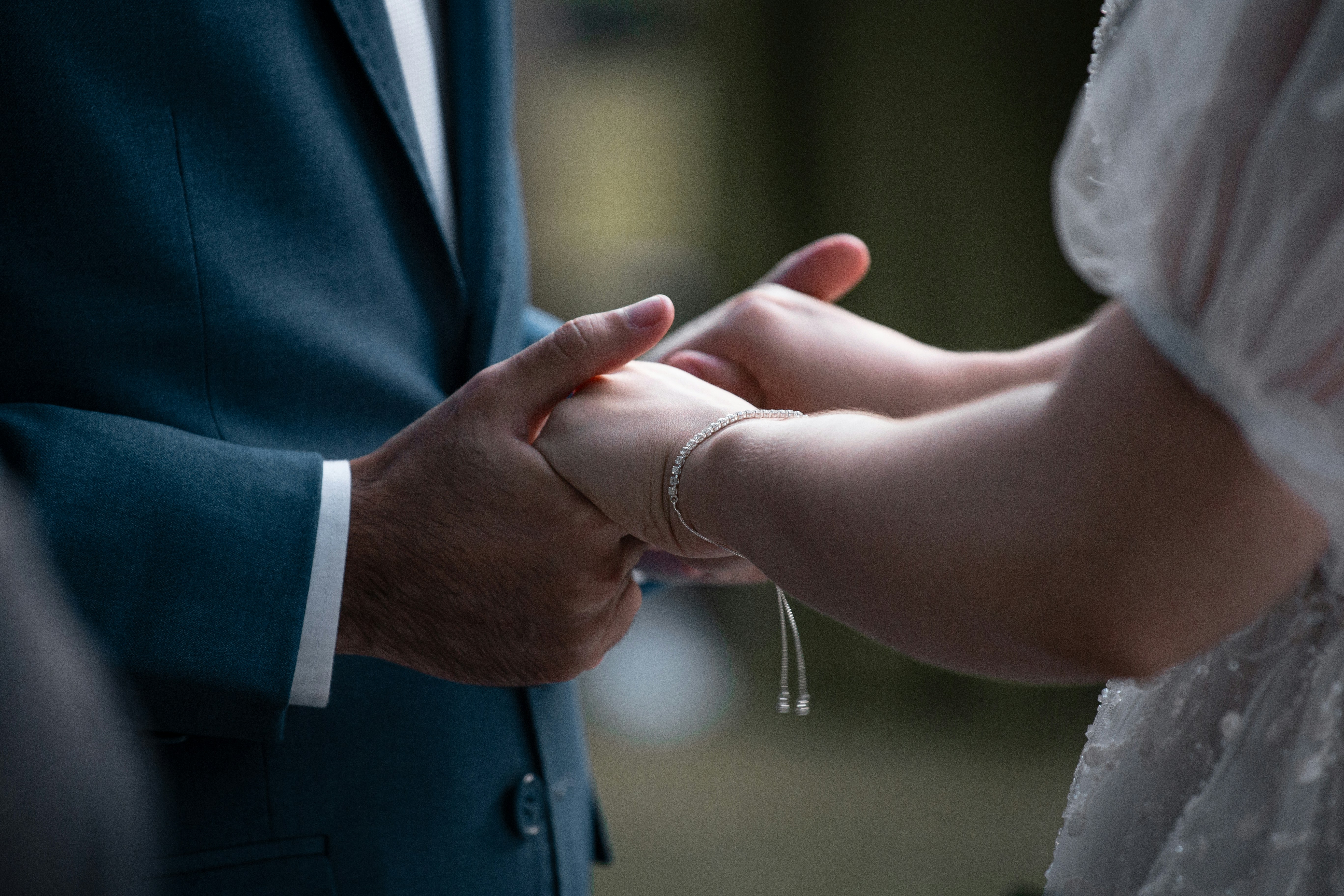 Hands in Harmony: A Moment of Forever Between Bride and Groom