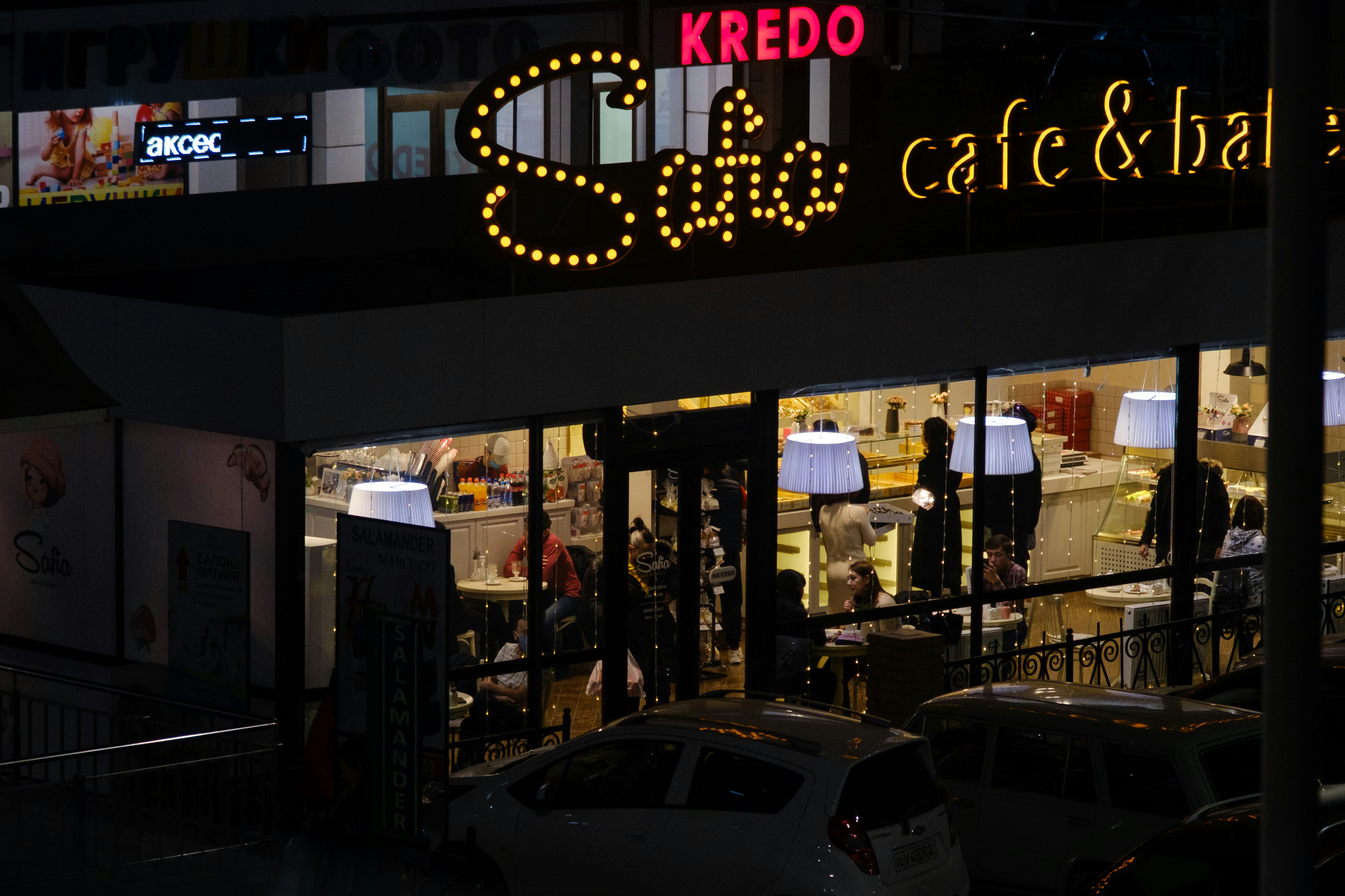 Neon Café Glow Through Evening Glass