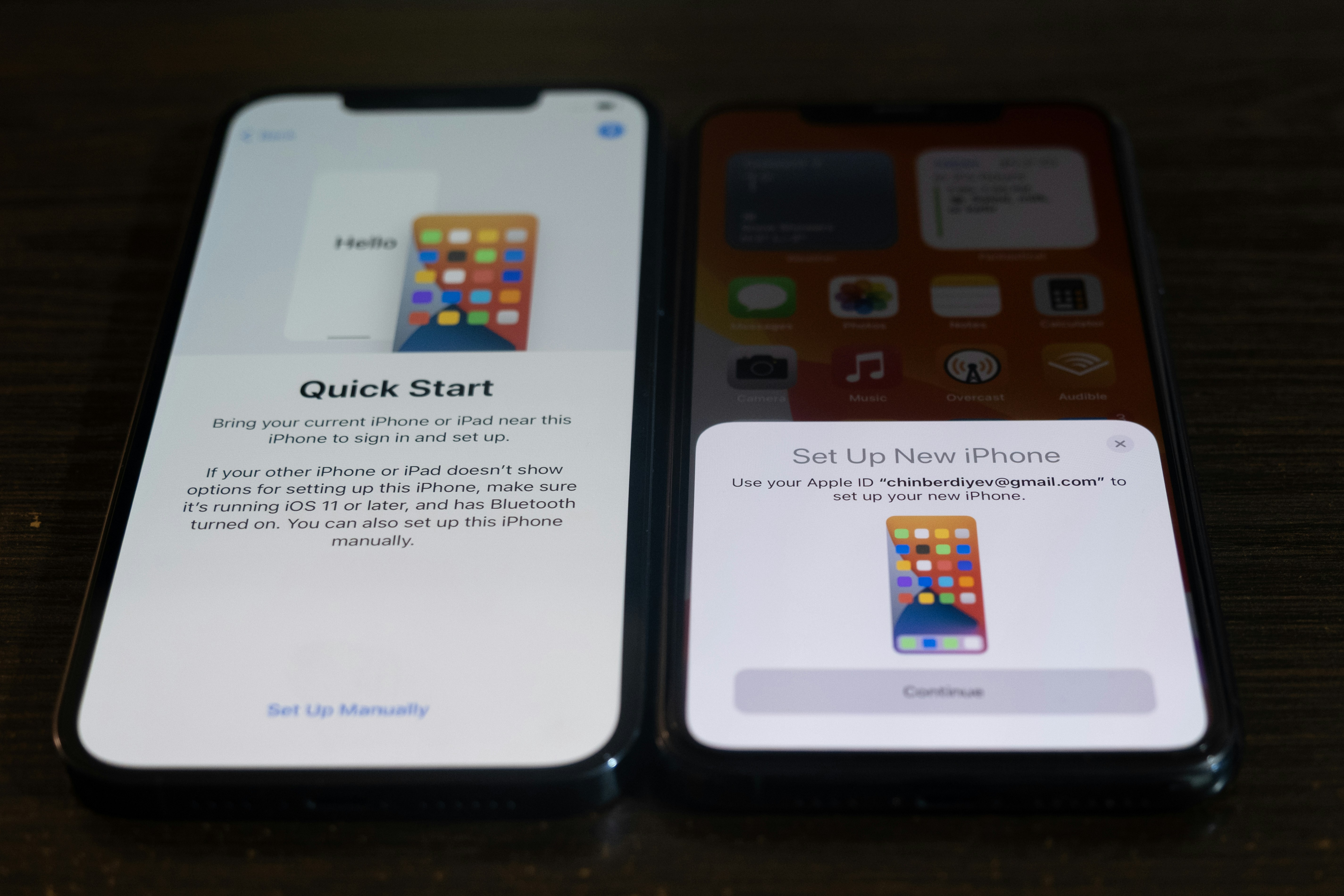 Dual iPhone Setup: Quick Start Screens Facing Each Other