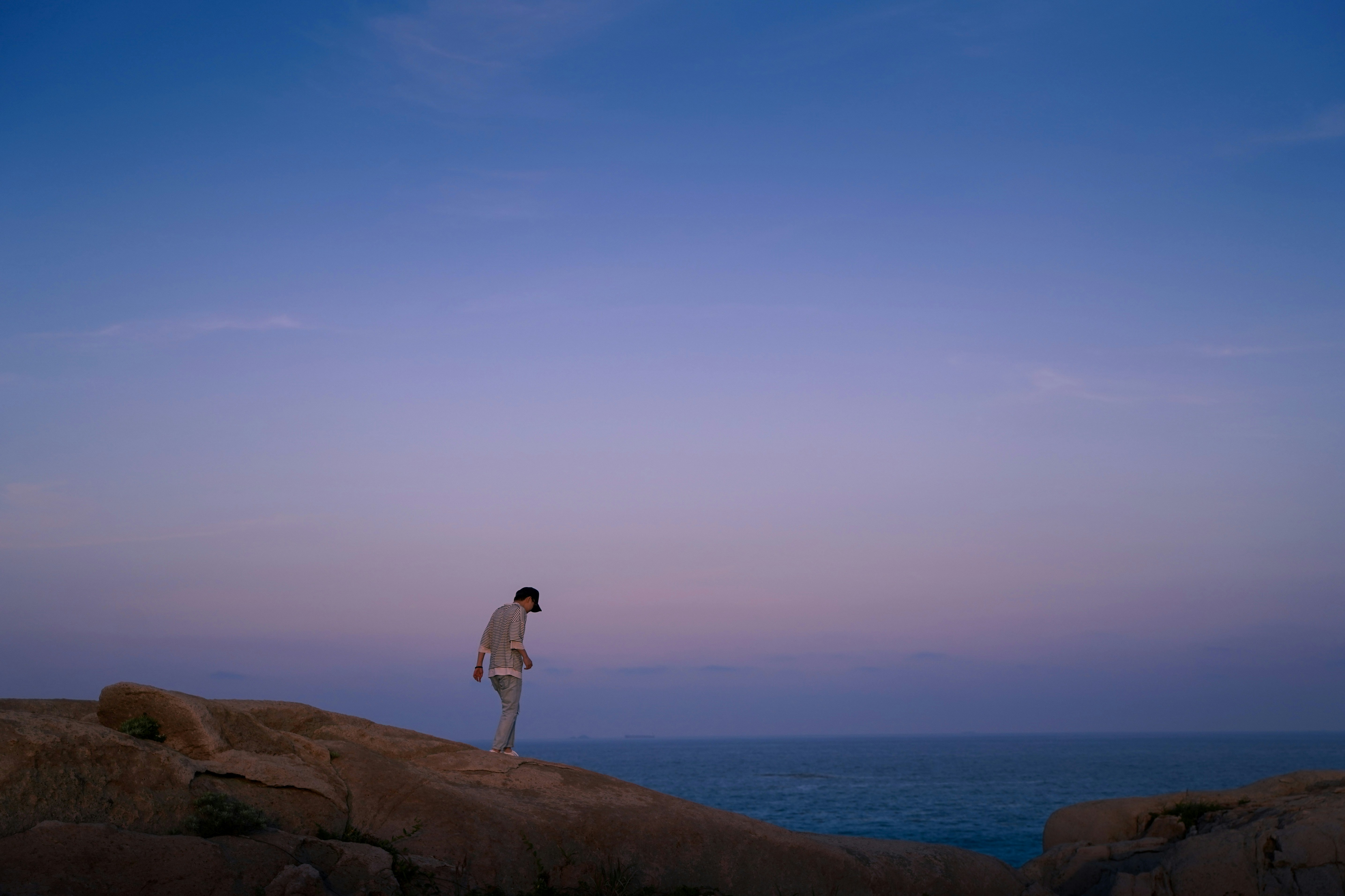 Isolated Figure at the Edge of Dusk