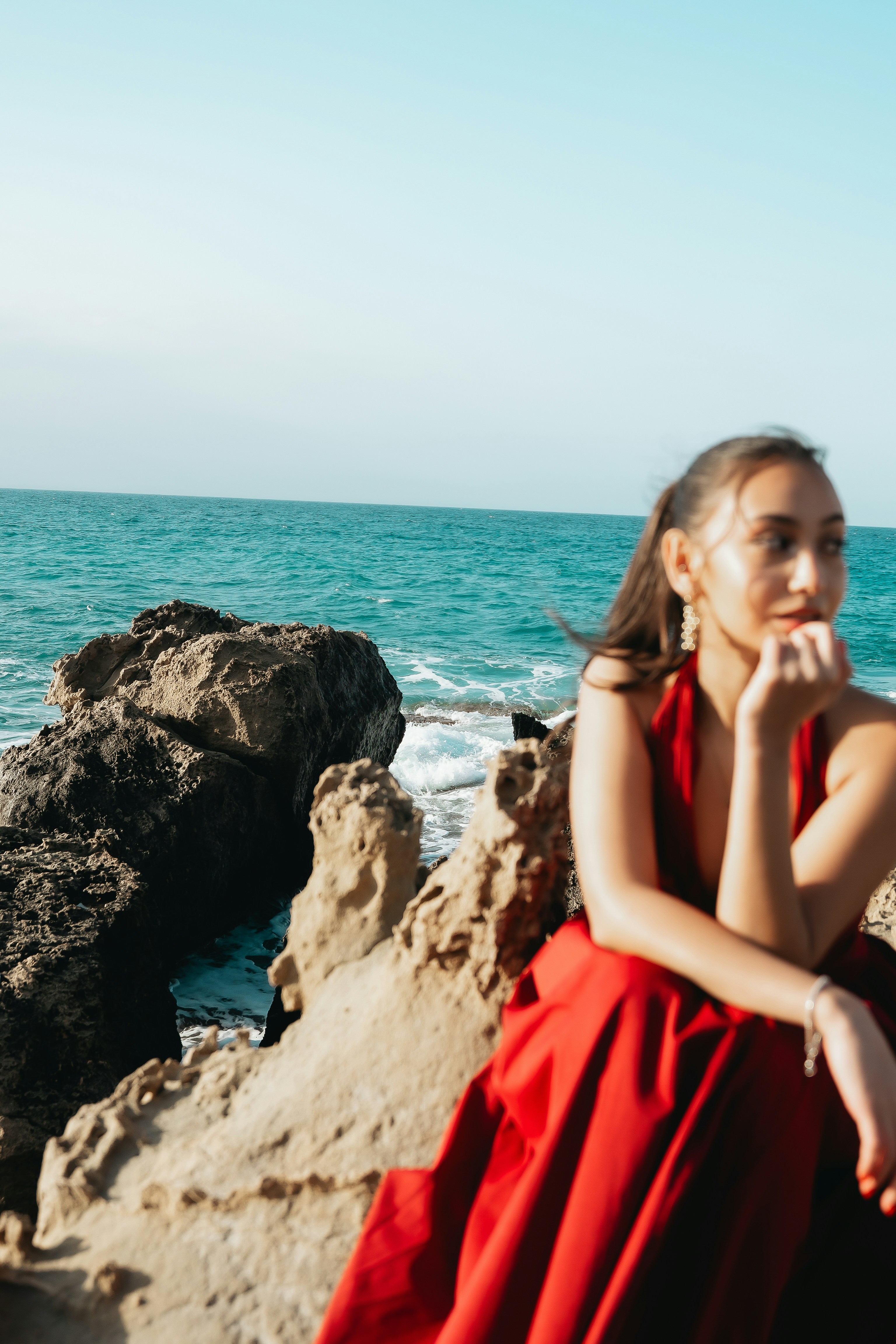 Red Dress on the Rocks: Ocean Breeze and a Daydream Pose