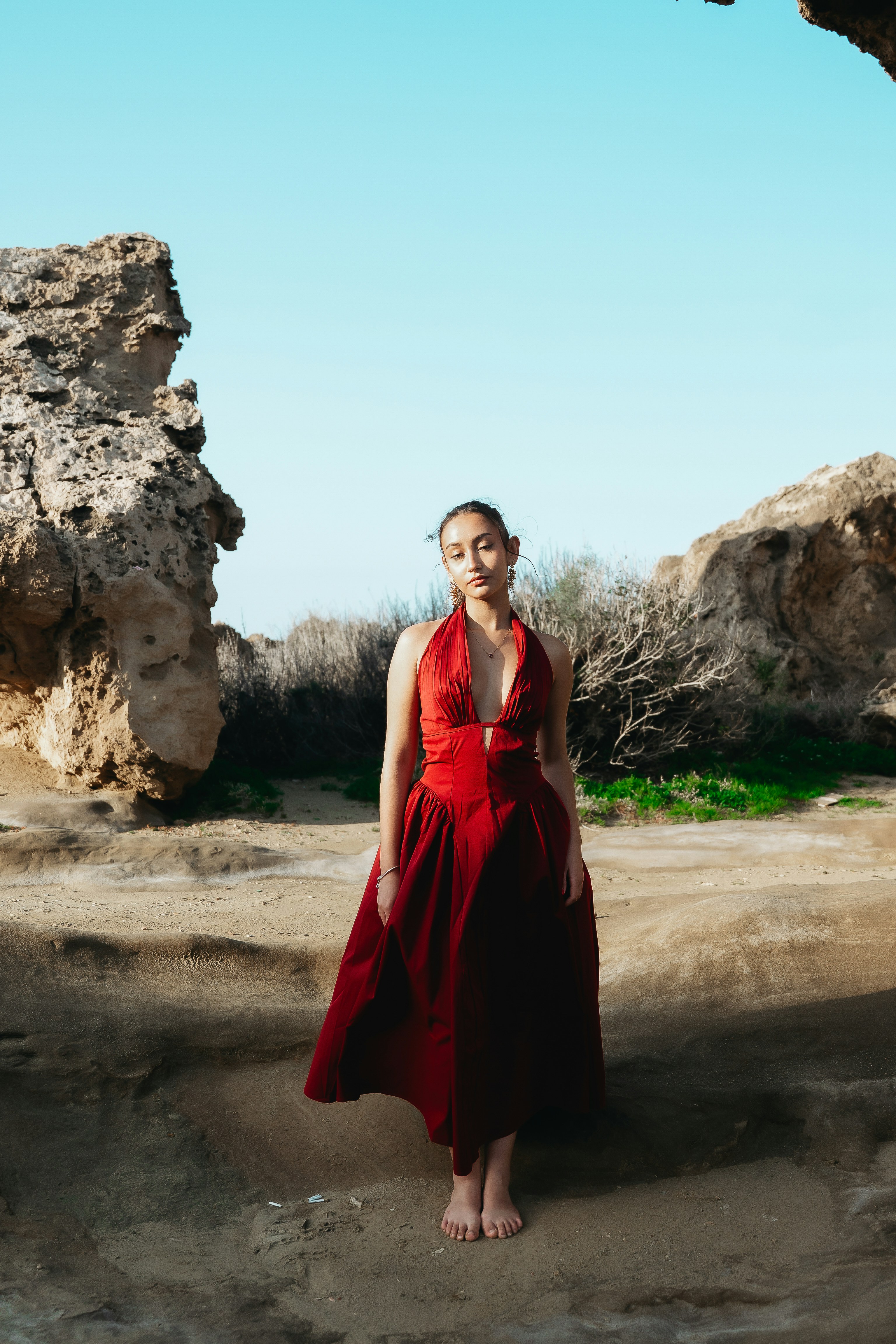 Red Dress in a Deserted Rock Arena