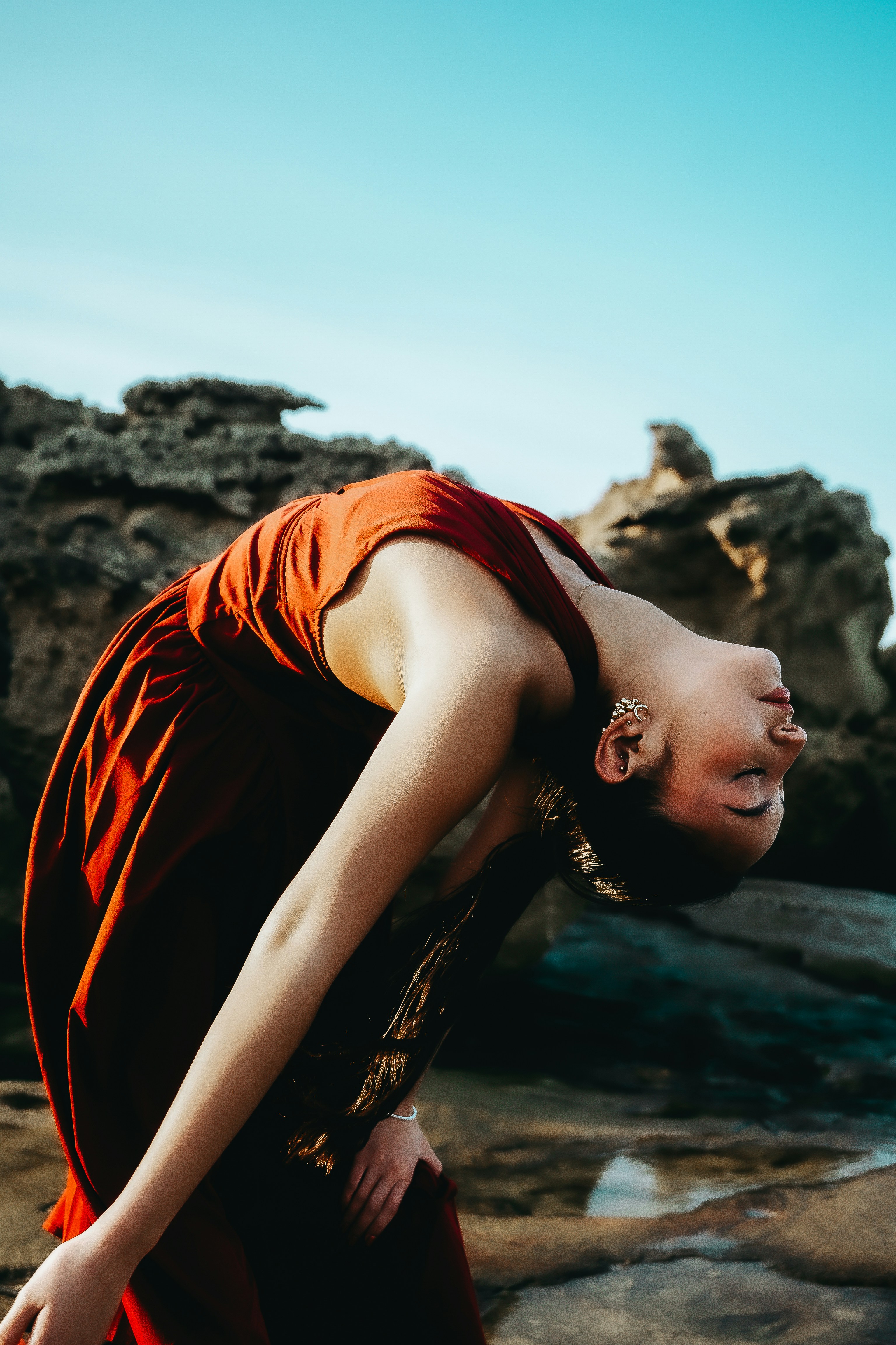Gravity of Red: A Dancer in a Coastal Bend