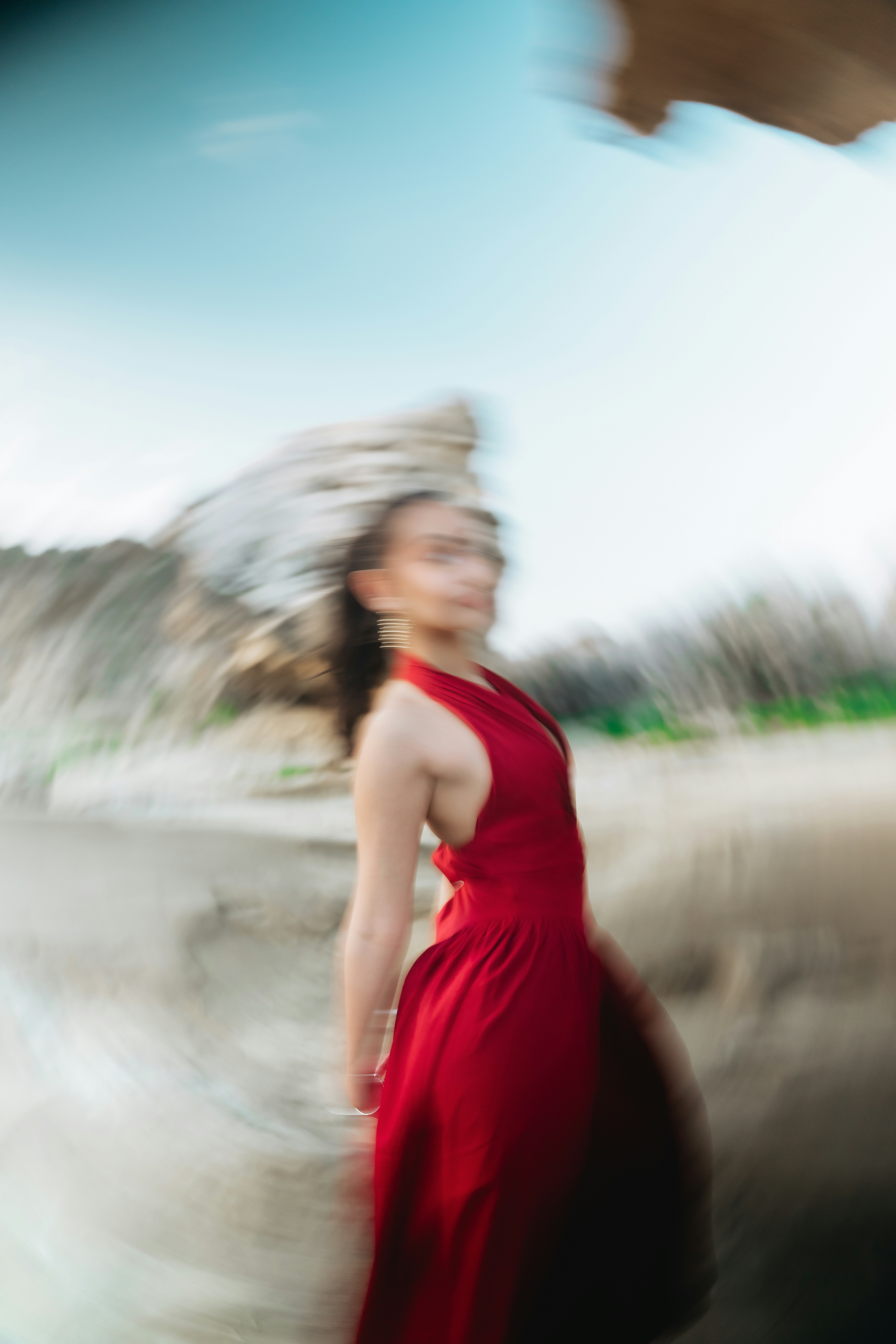 Red Dress in a Shifting Frame