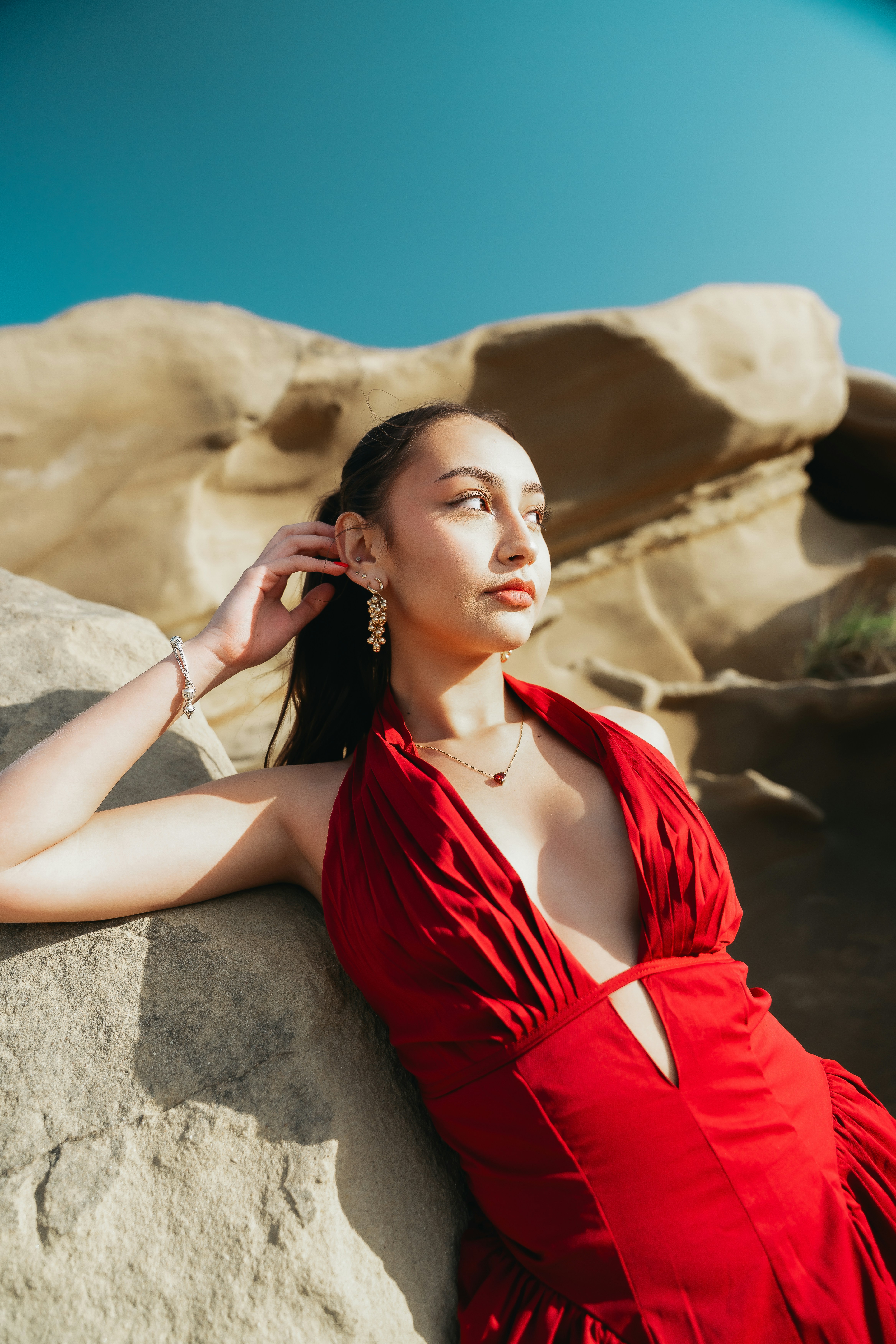 Crimson Silk in Sunlit Cliffs