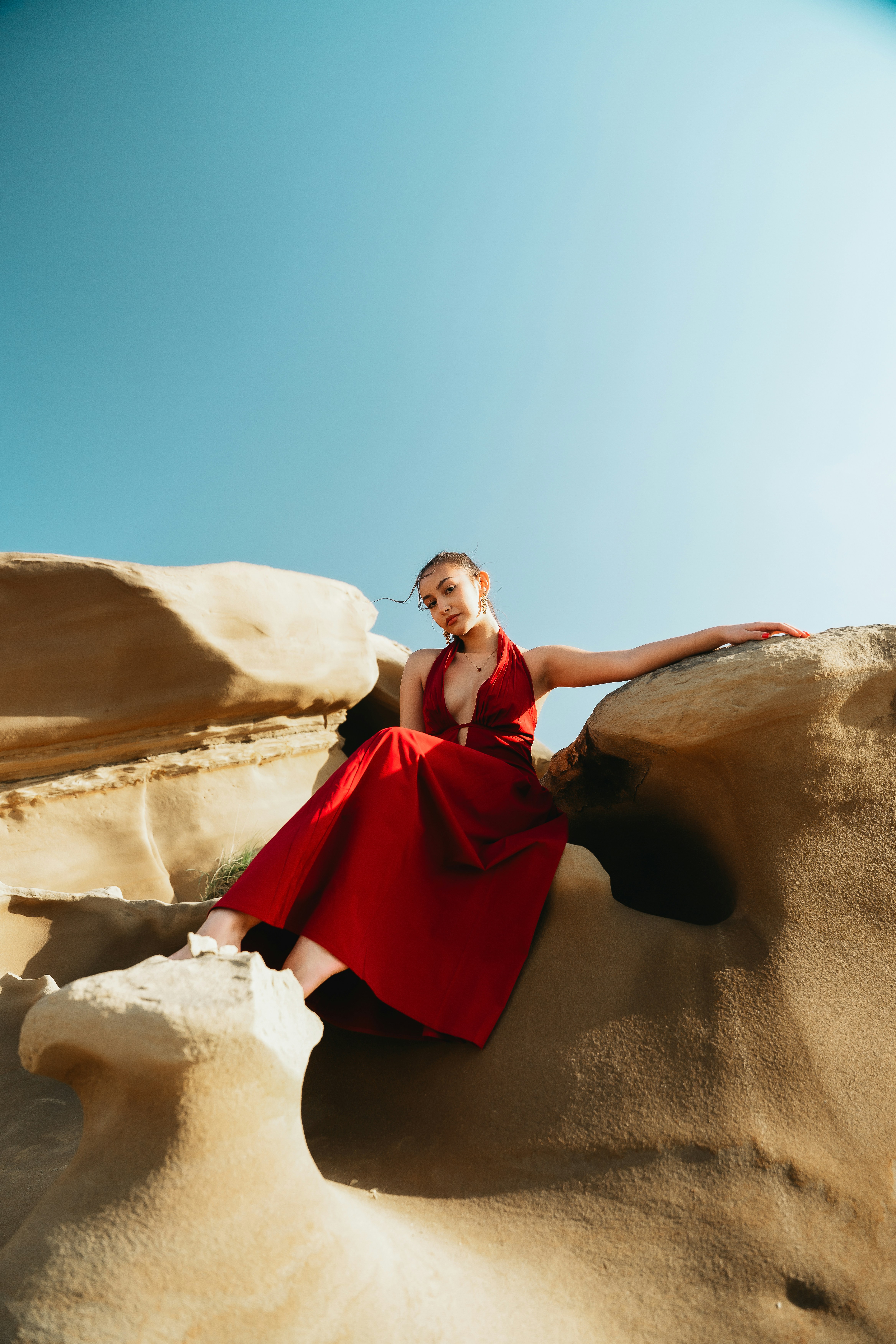 Red Dress Rest on Canyon Sill