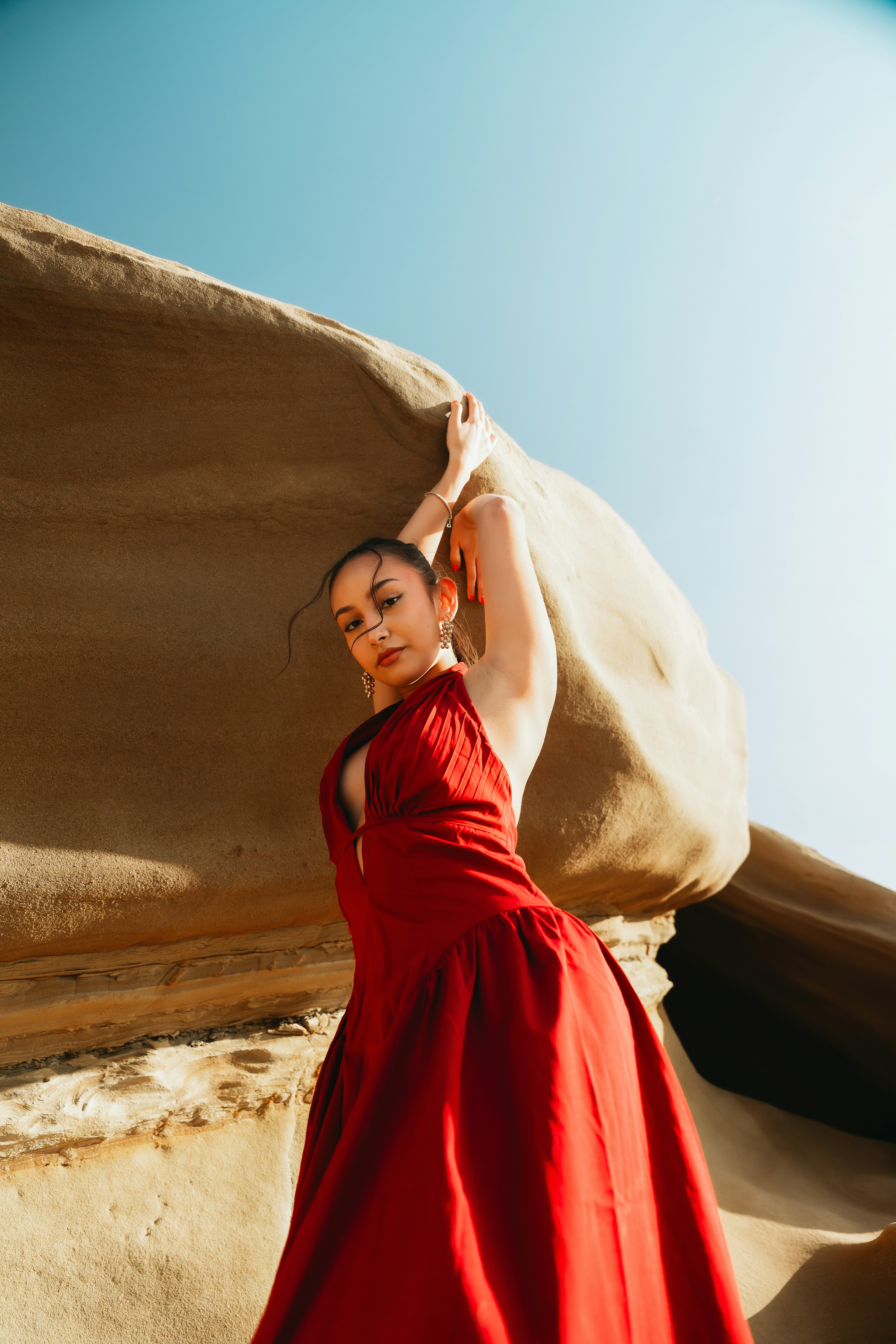 Red Dress Against Desert Stone
