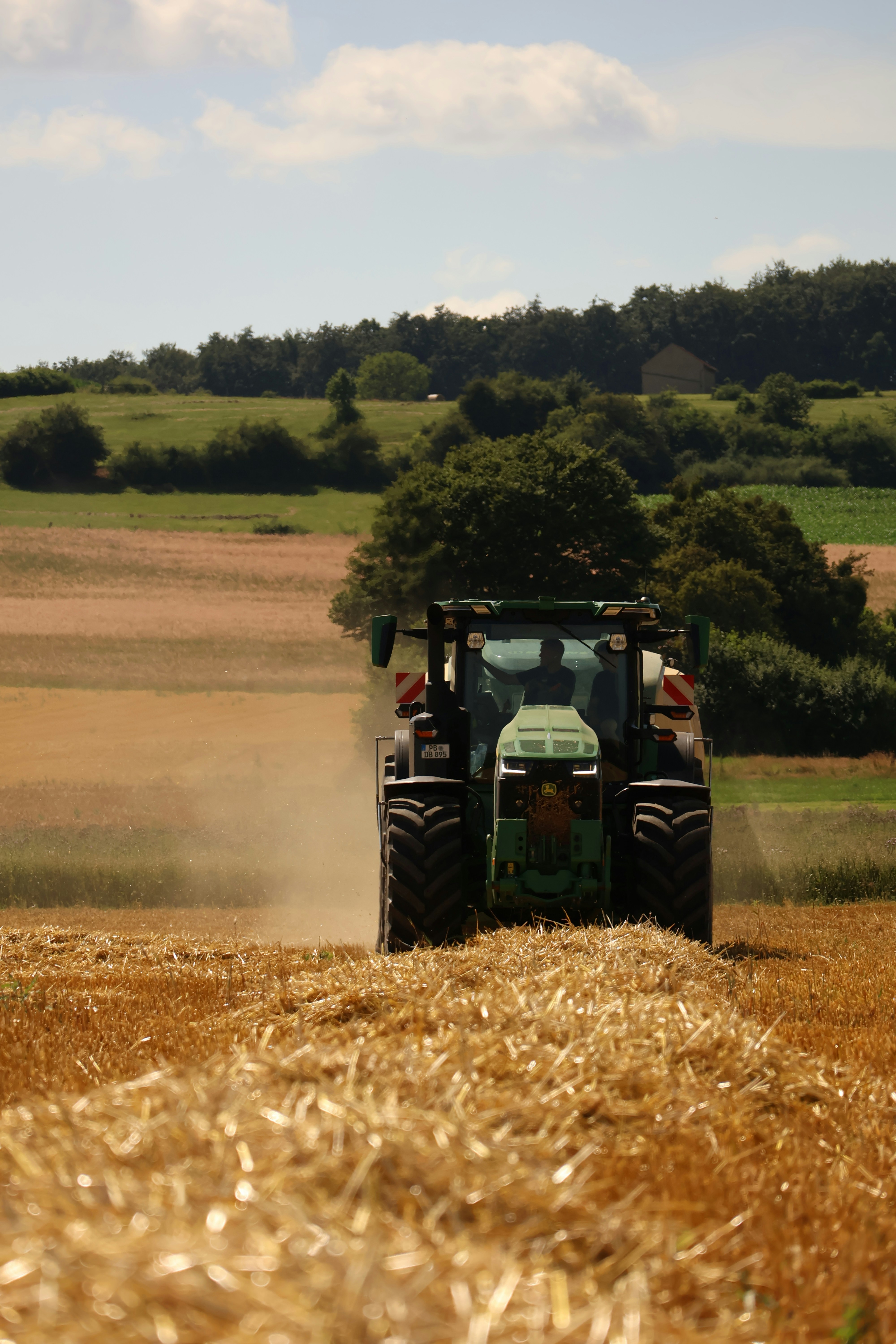 Forward Field: Tractor Spearheading the Harvest