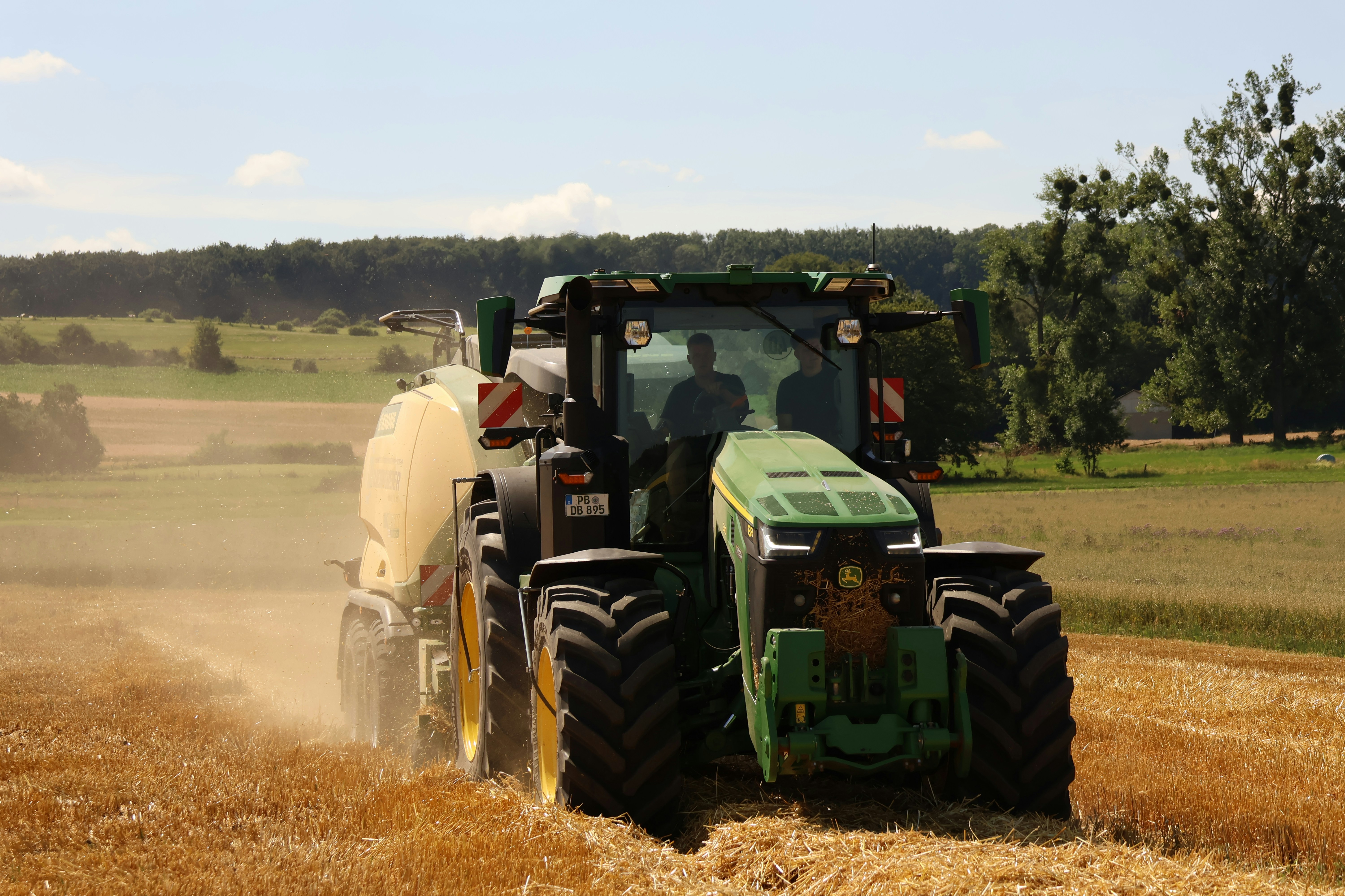 Dust Trail and Green Giant: A Tractor Plows Forward