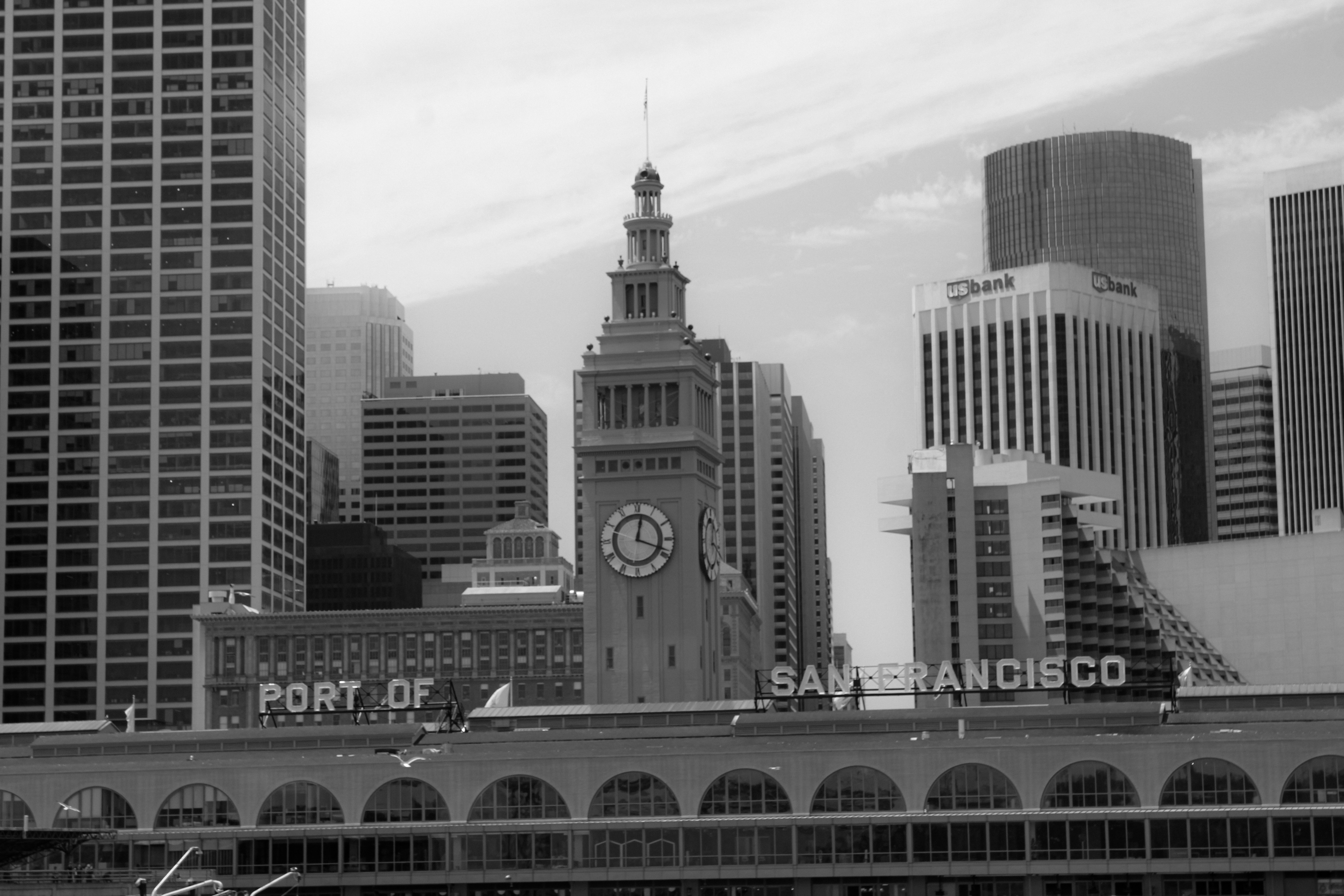 Clock Tower Over San Francisco: A Black-and-White Bayfront Scene