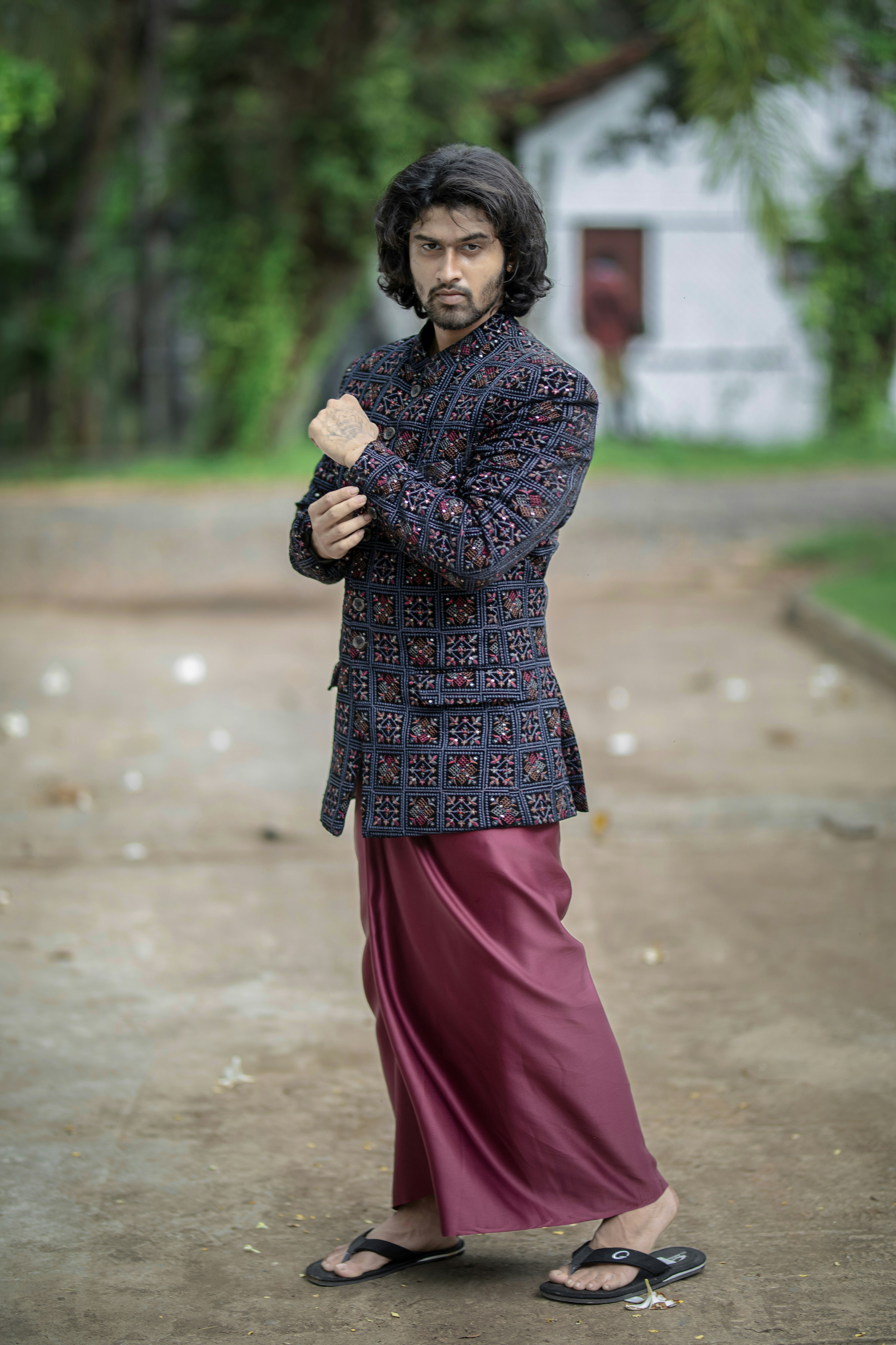 Maroon Silk Sari Meets Geometric Velvet: A Quiet Stance