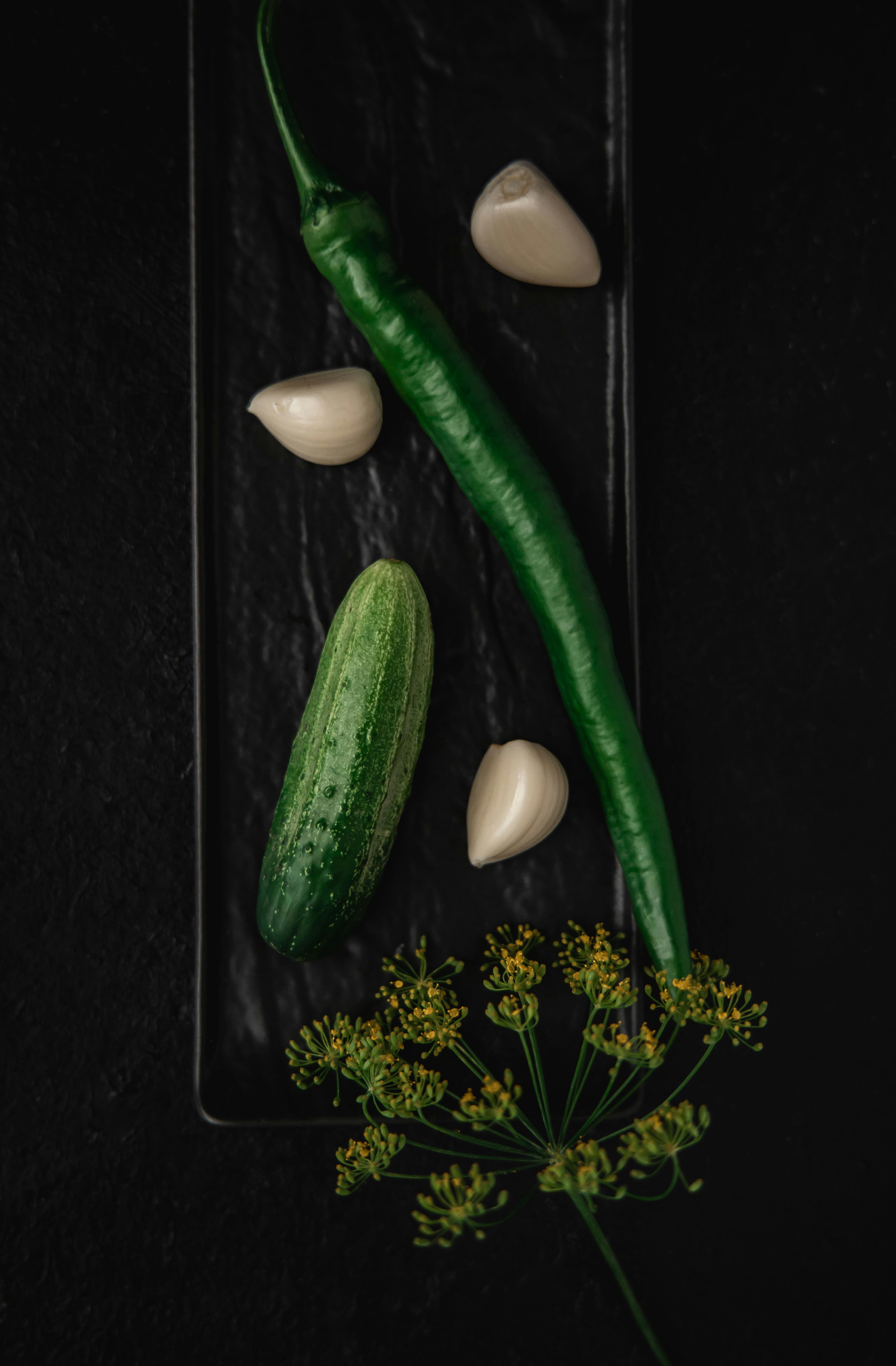 Green Chili Trio: A Still Life of Fresh Produce on Dark Slate