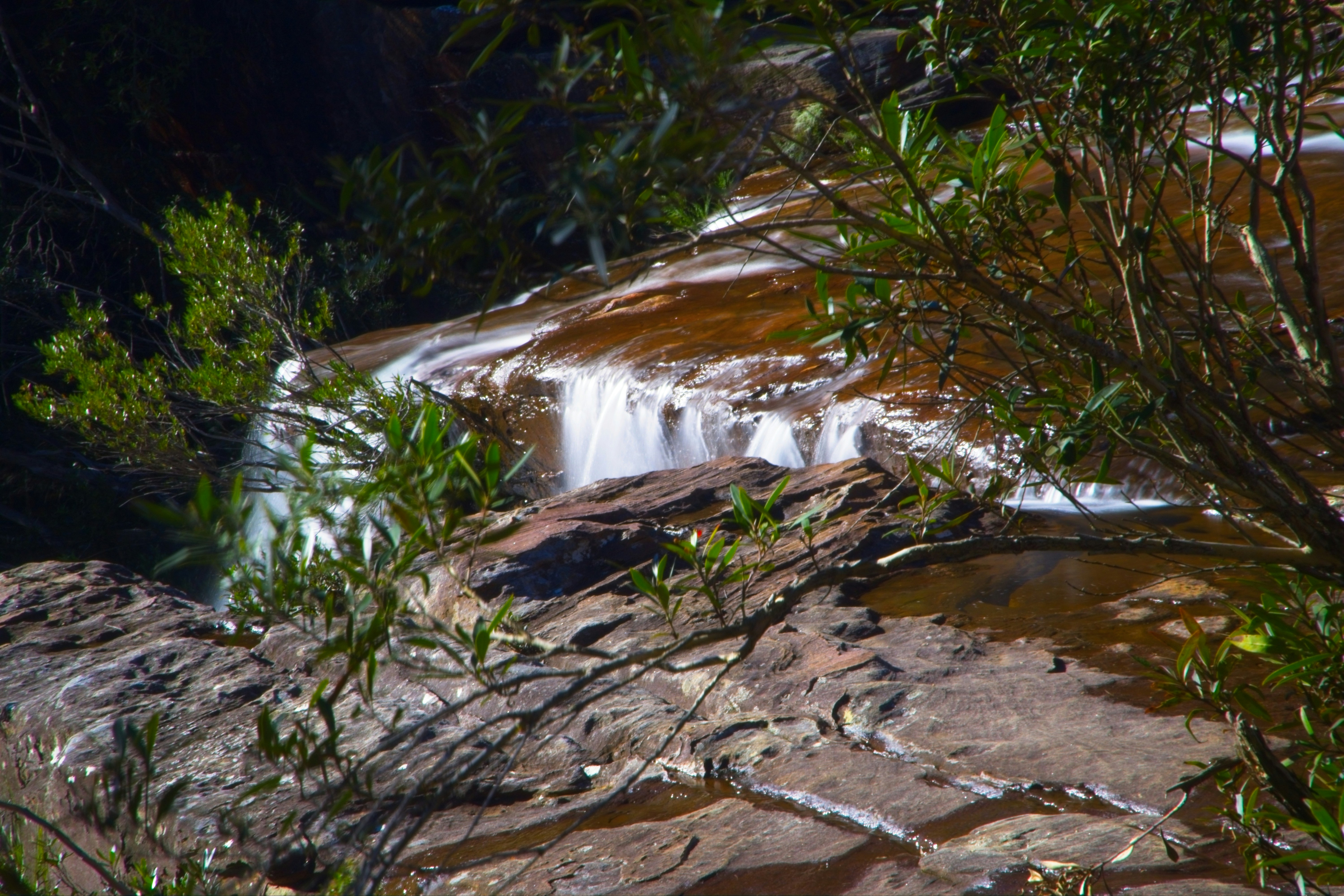 Whispering Cascade Between Granite Ridges