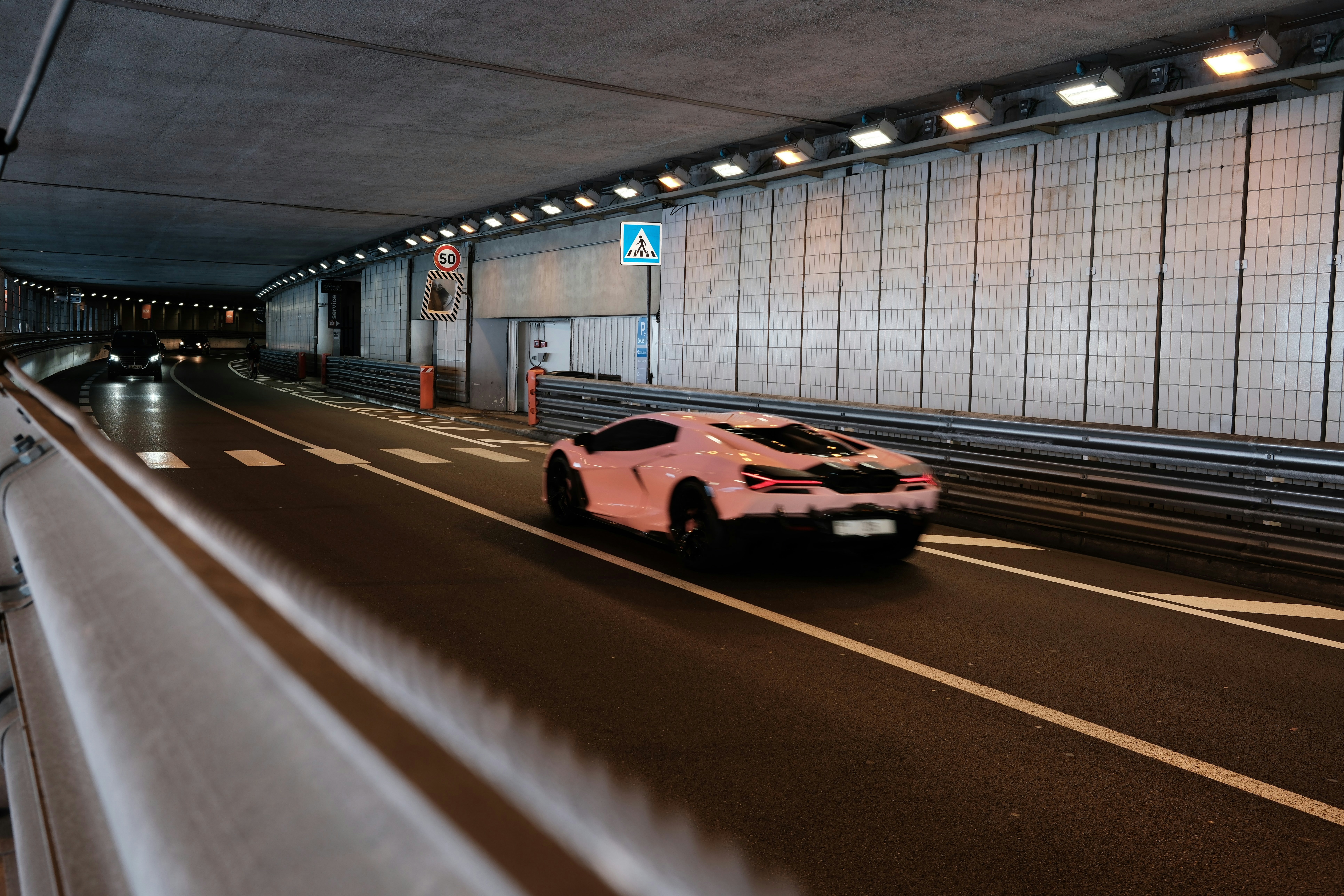 Pink Porsche in a Neon Tunnel: A Night Drive Through Light and Motion