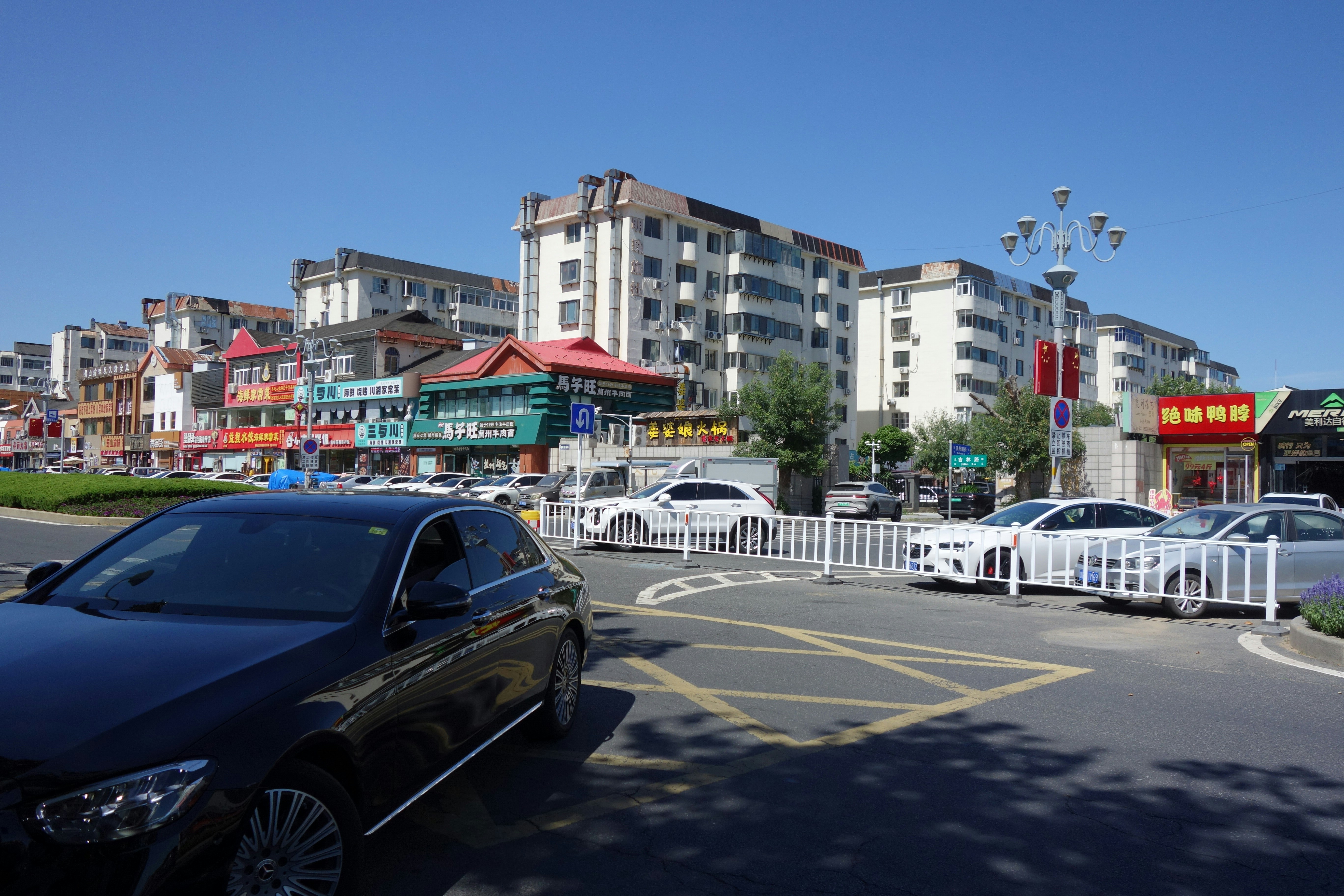 Urban Streetfront Under Clear Blue Sky