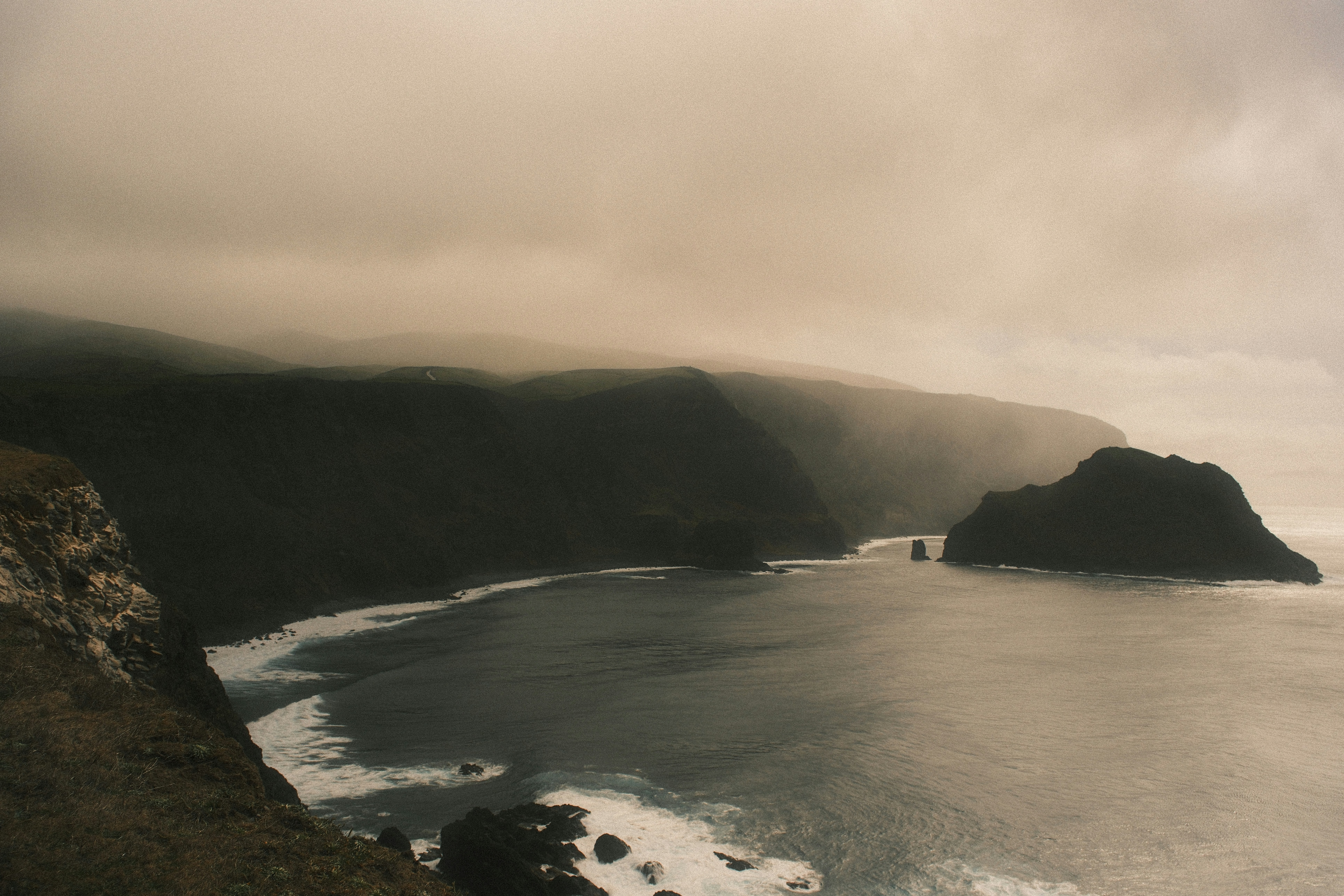 Misty Cliffs Over a Quiet Atlantic