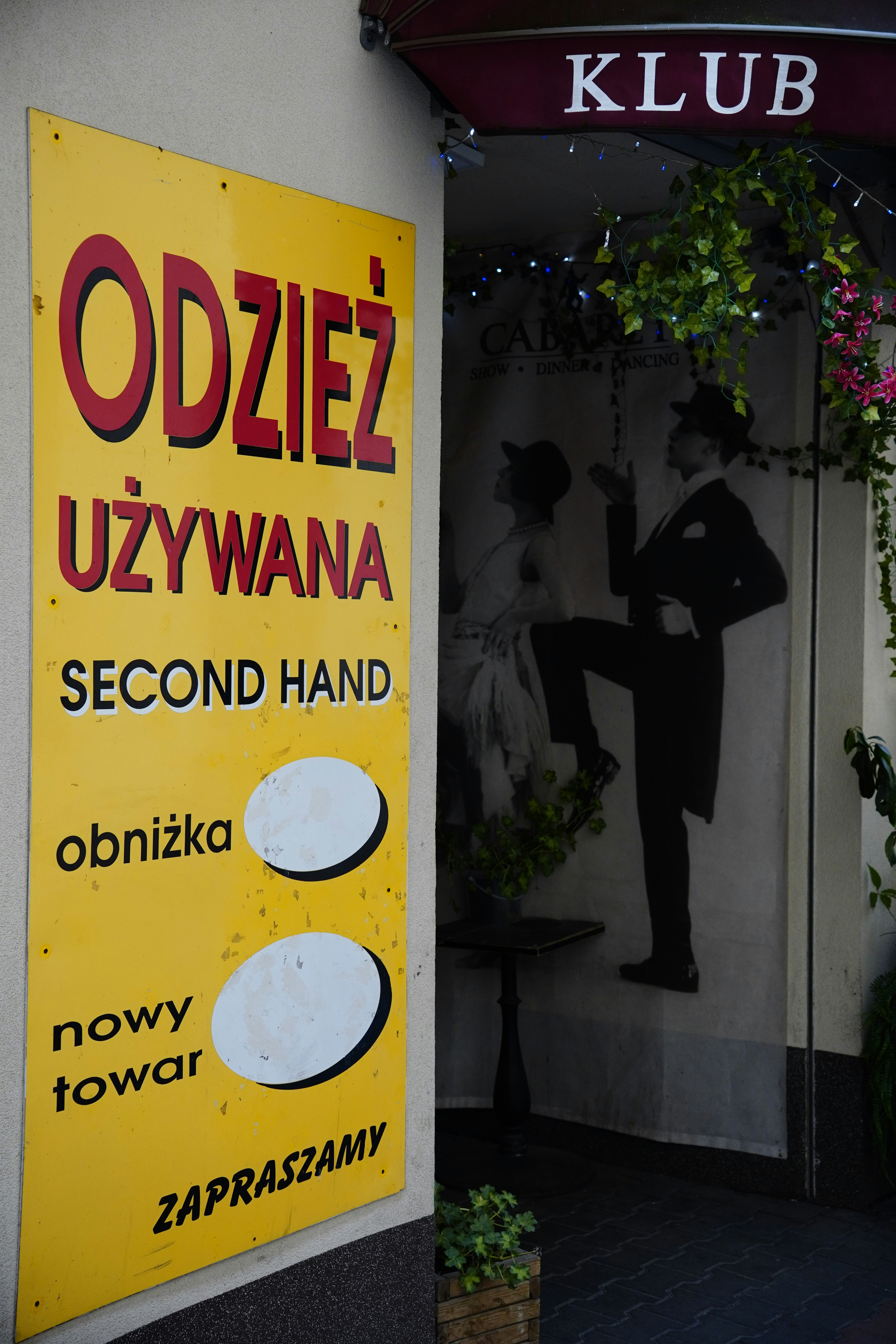 Yellow Sign, Dark Silhouette: A Street Entrance of Contrasts