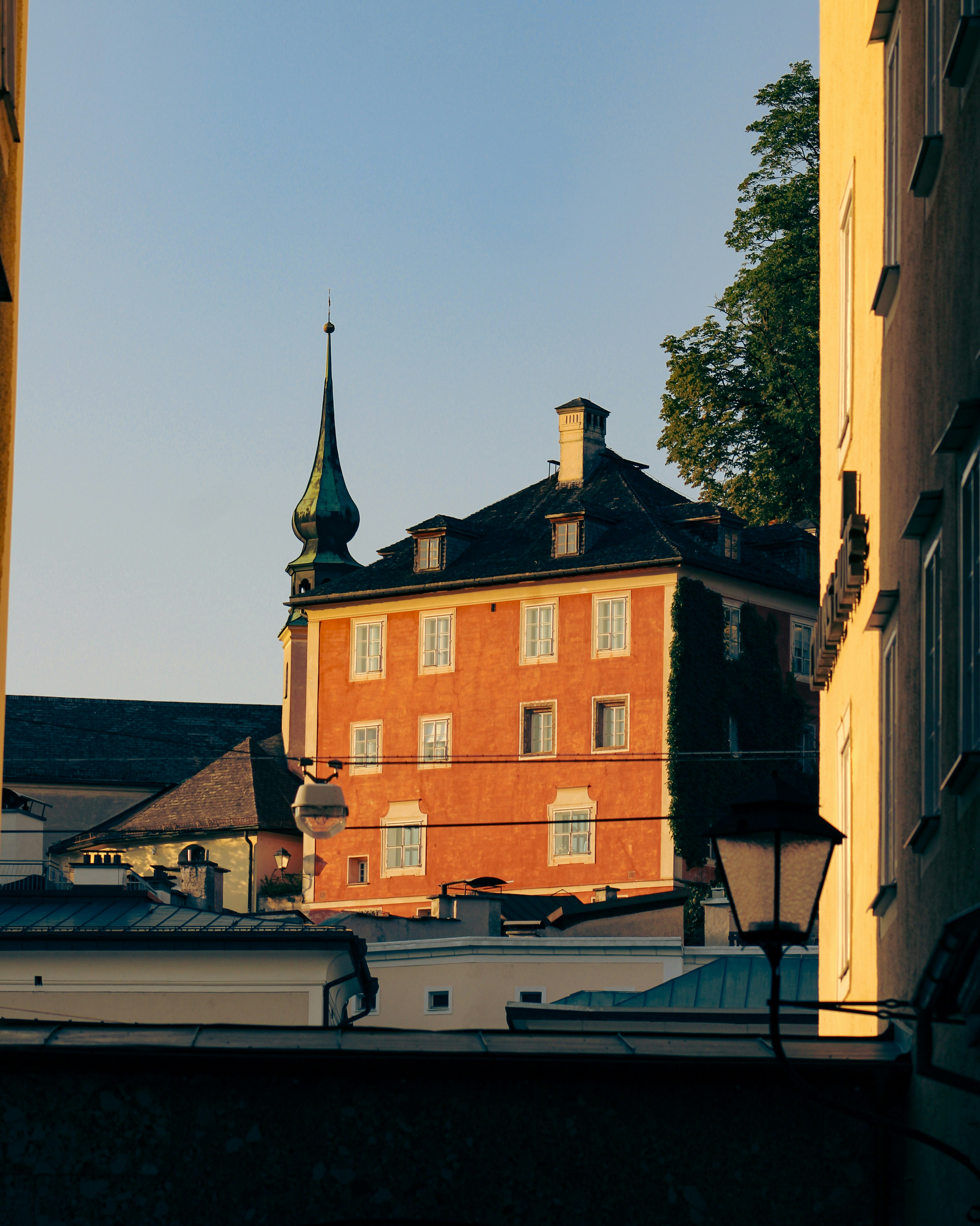 Warm Sunset Over a European Courtyard Facade
