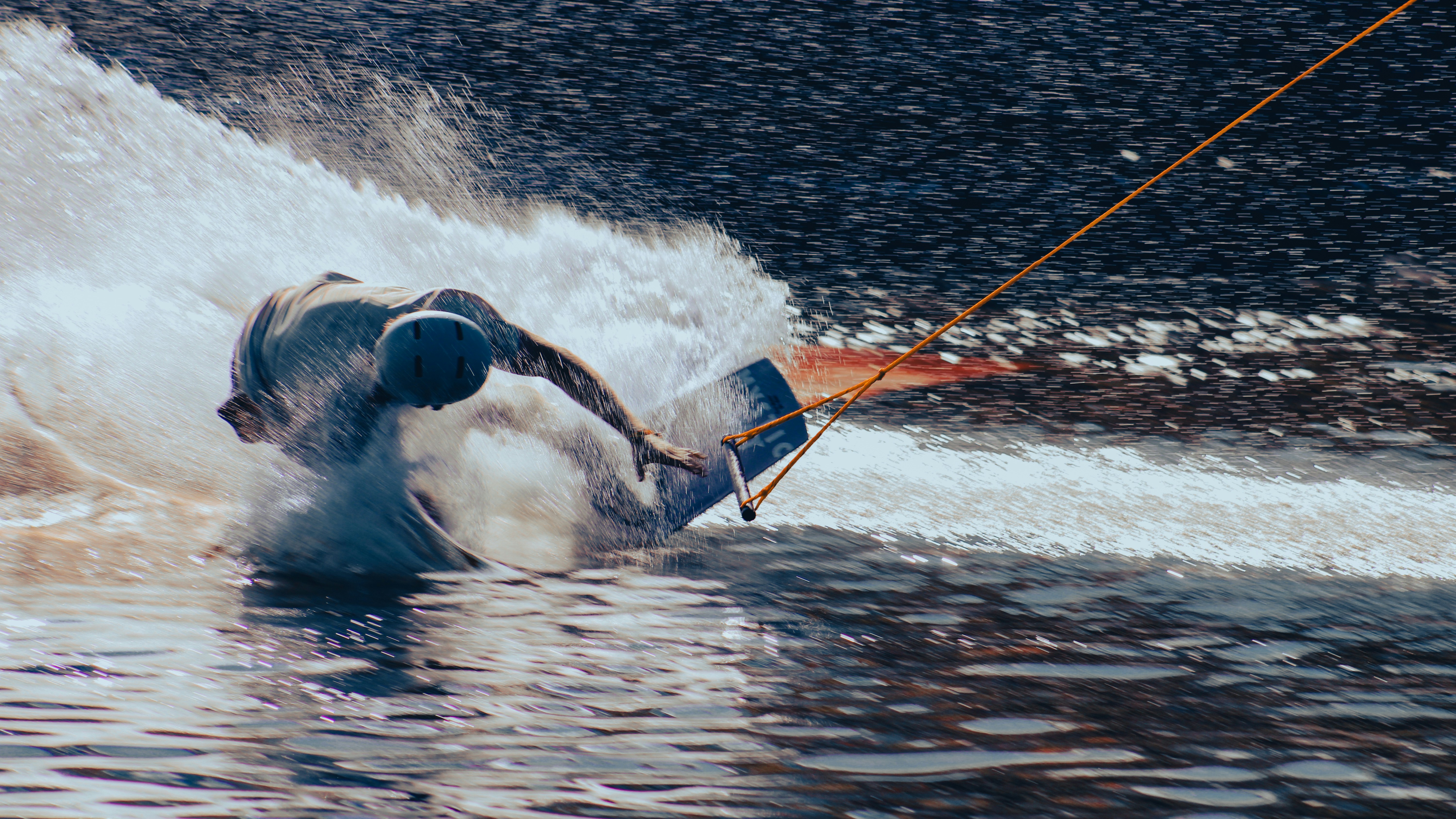 Rider Carving a Cresting Wake: A Burst of Water and Momentum