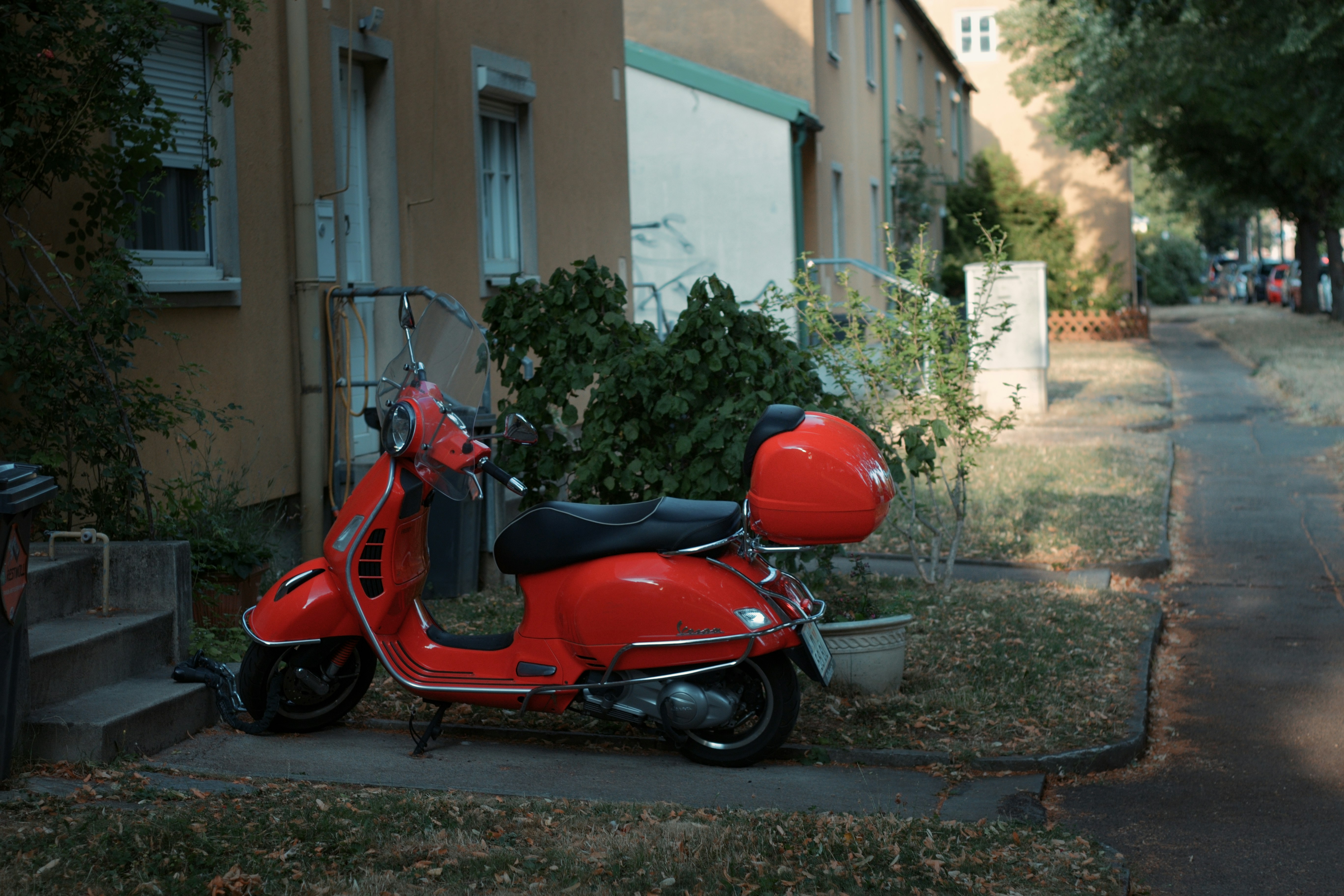 Red Vespa by the Quiet Alley