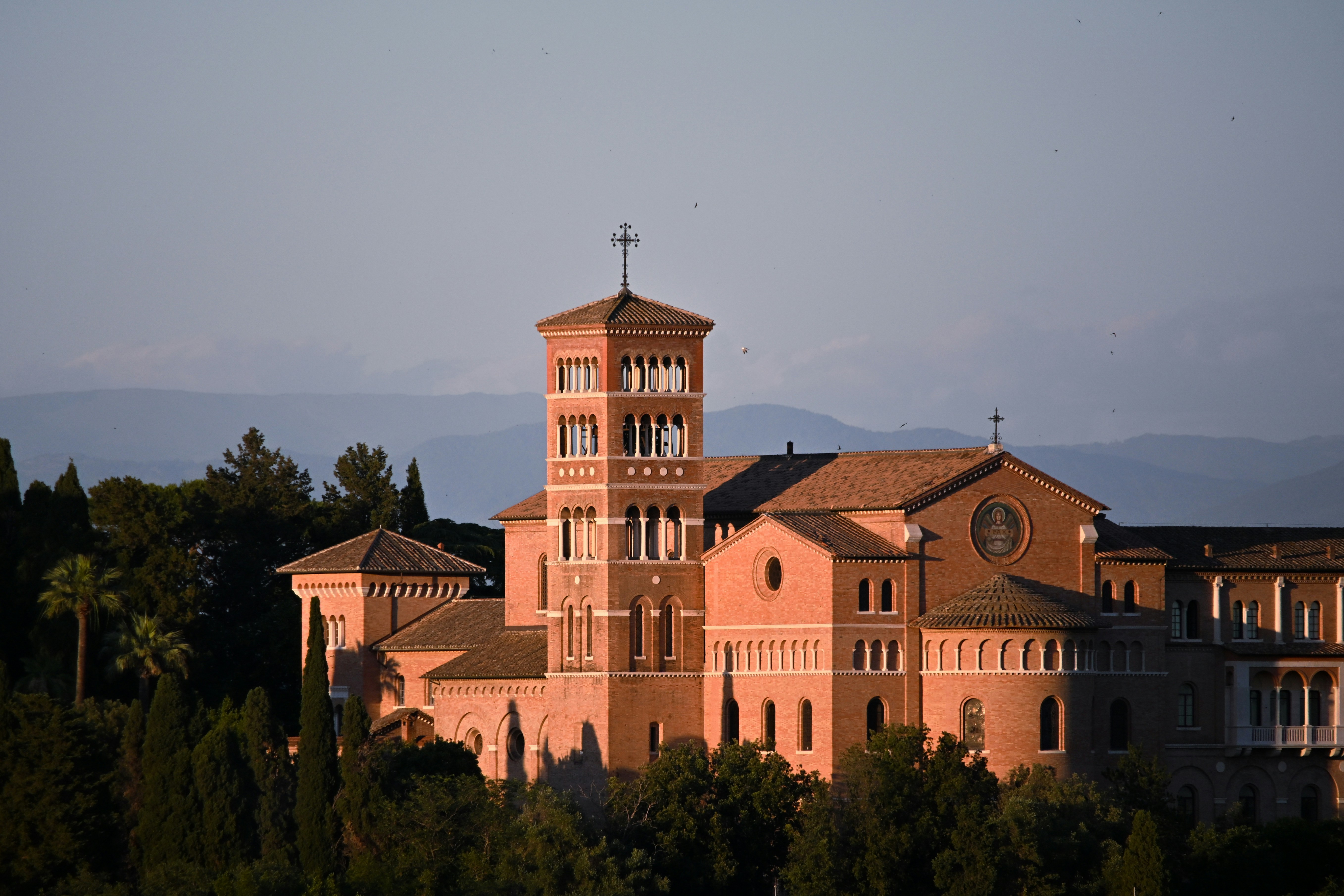 Sunlit Brick Bell-Tower of the Riverside Monastery