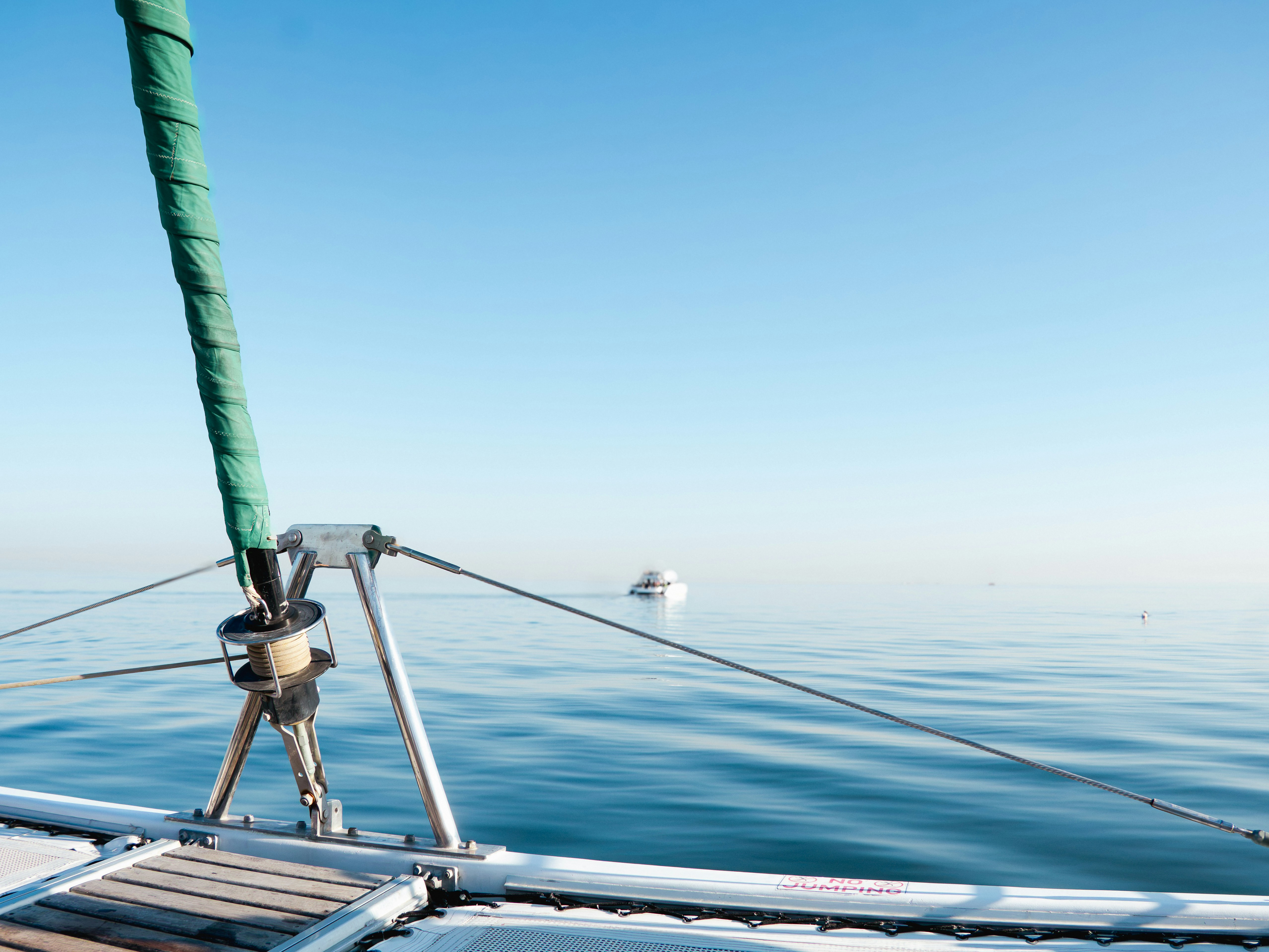 Toward the Horizon: A Sailboat’s Station at Sea
