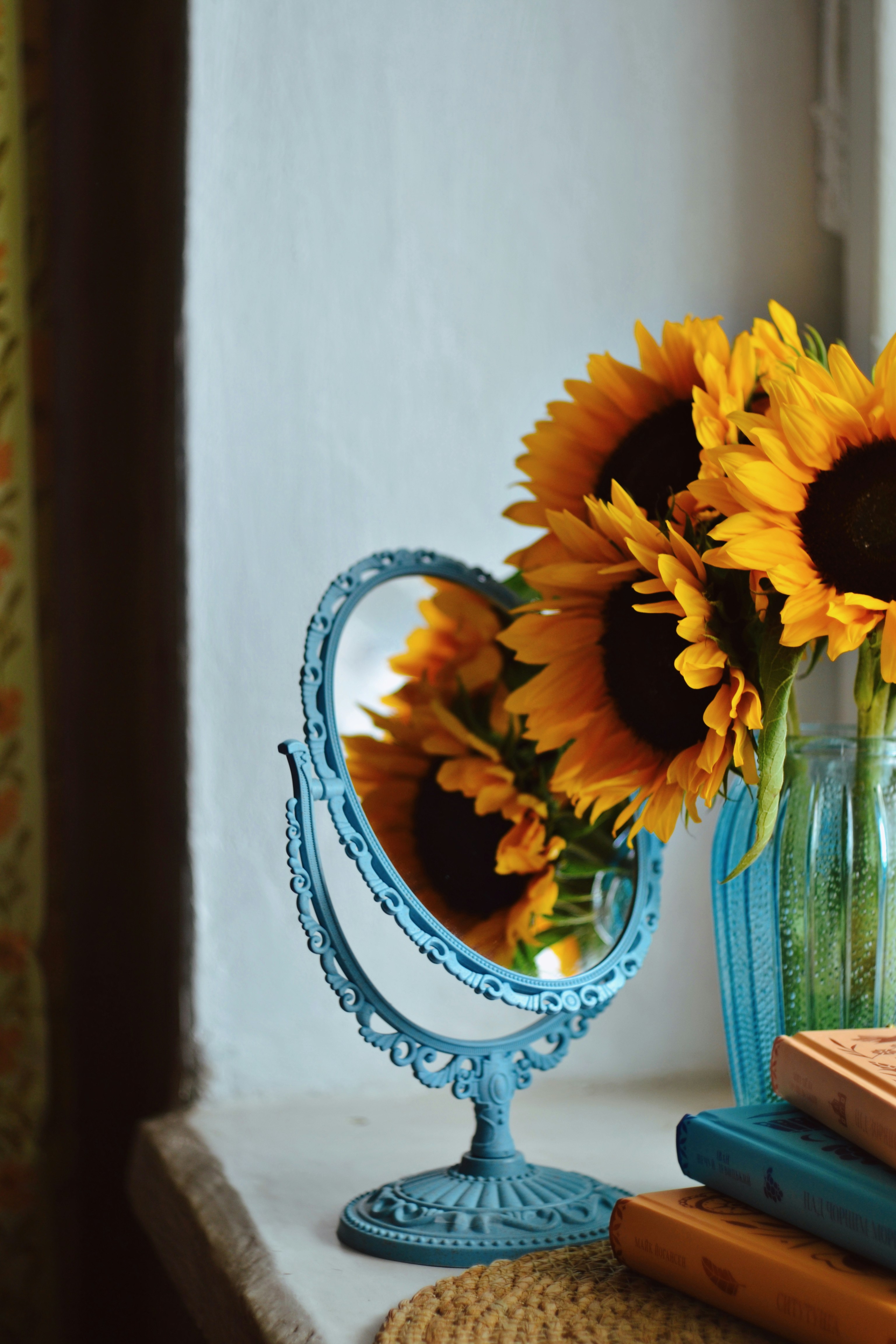 Sunlit Sunflowers in a Teal Glass Moment
