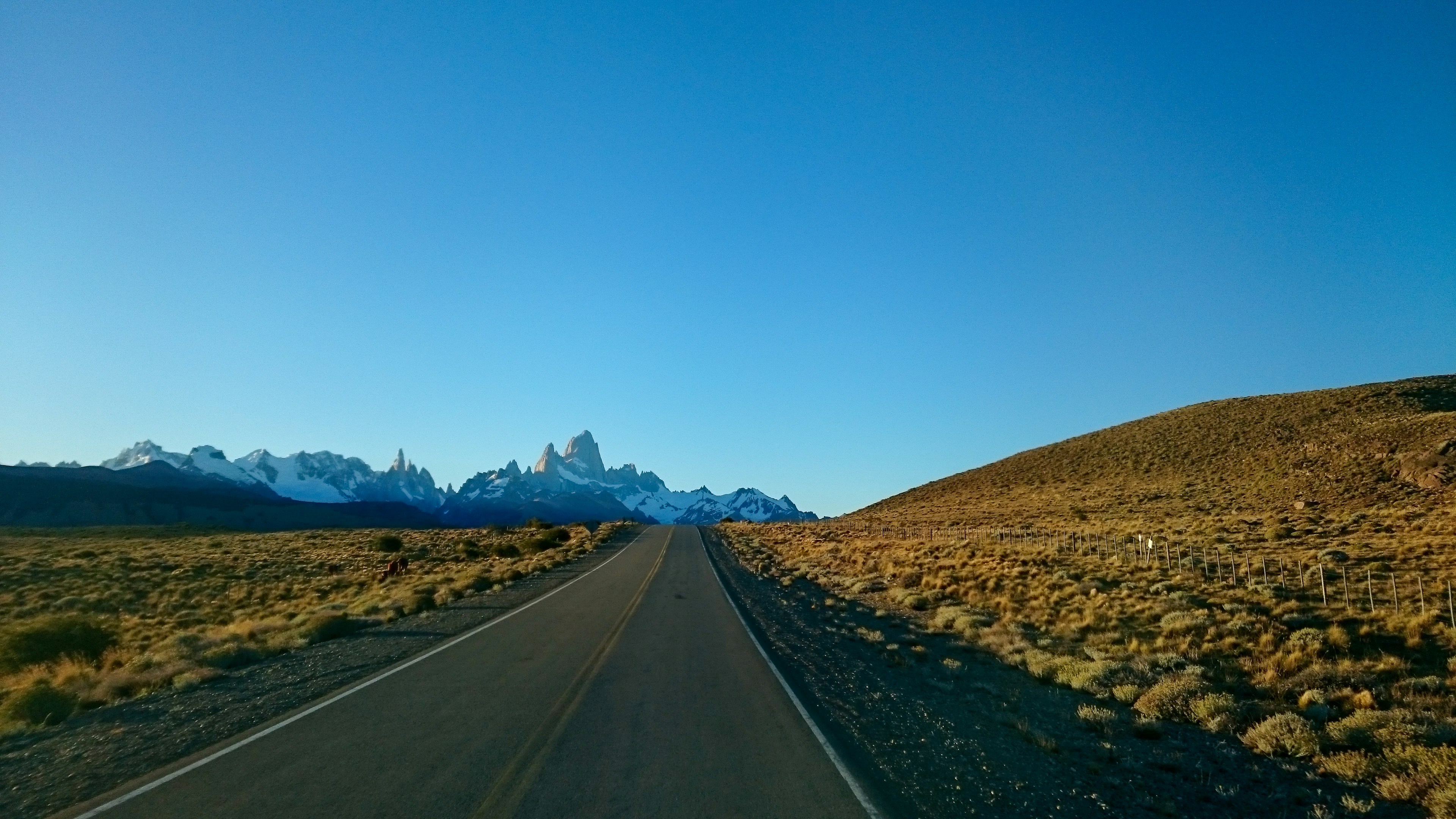 Desert Highway to the Distant Peaks