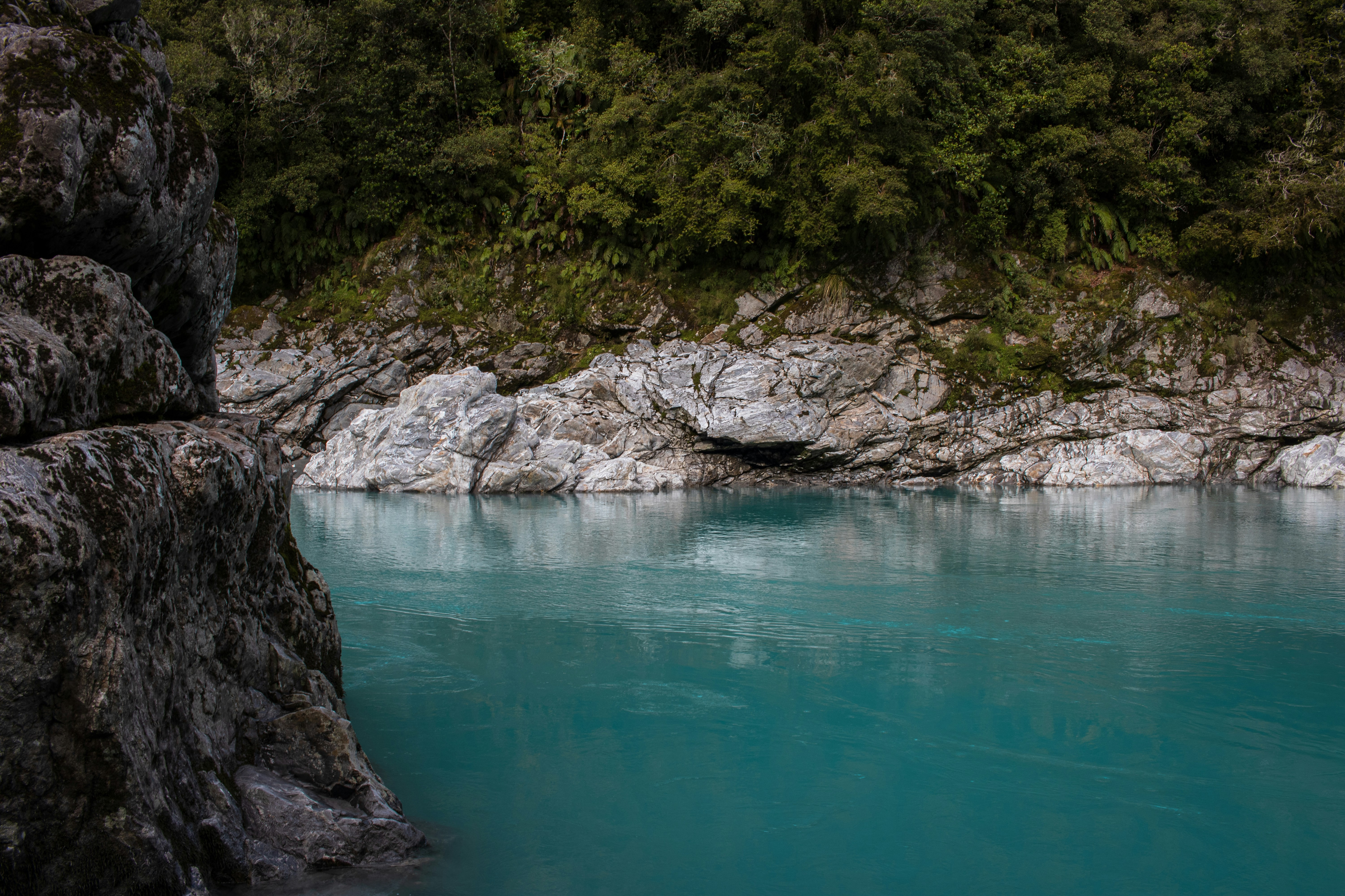 Teal River Gorge Between Weathered Rocks