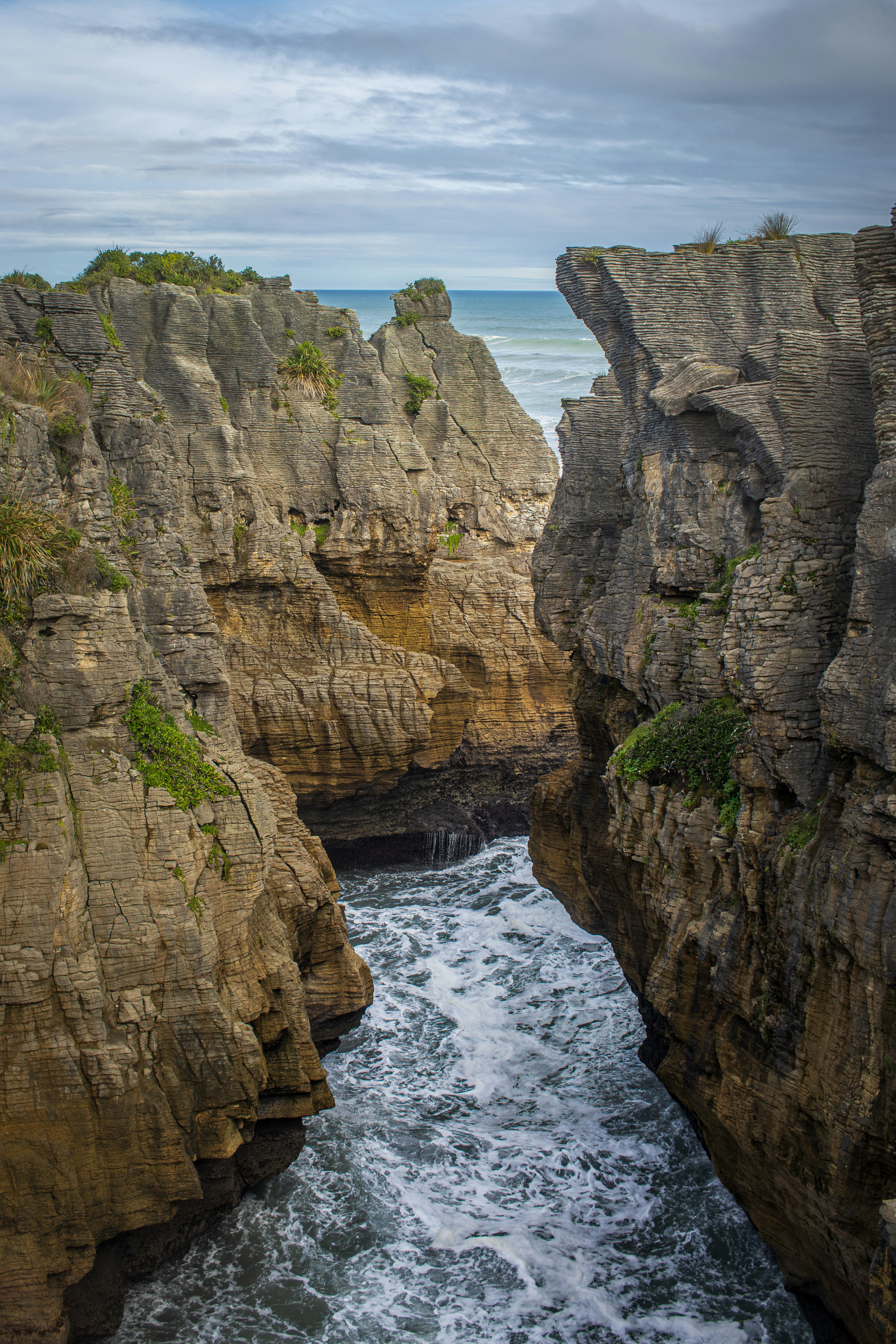 Chasm Between Sea-Stained Cliffs