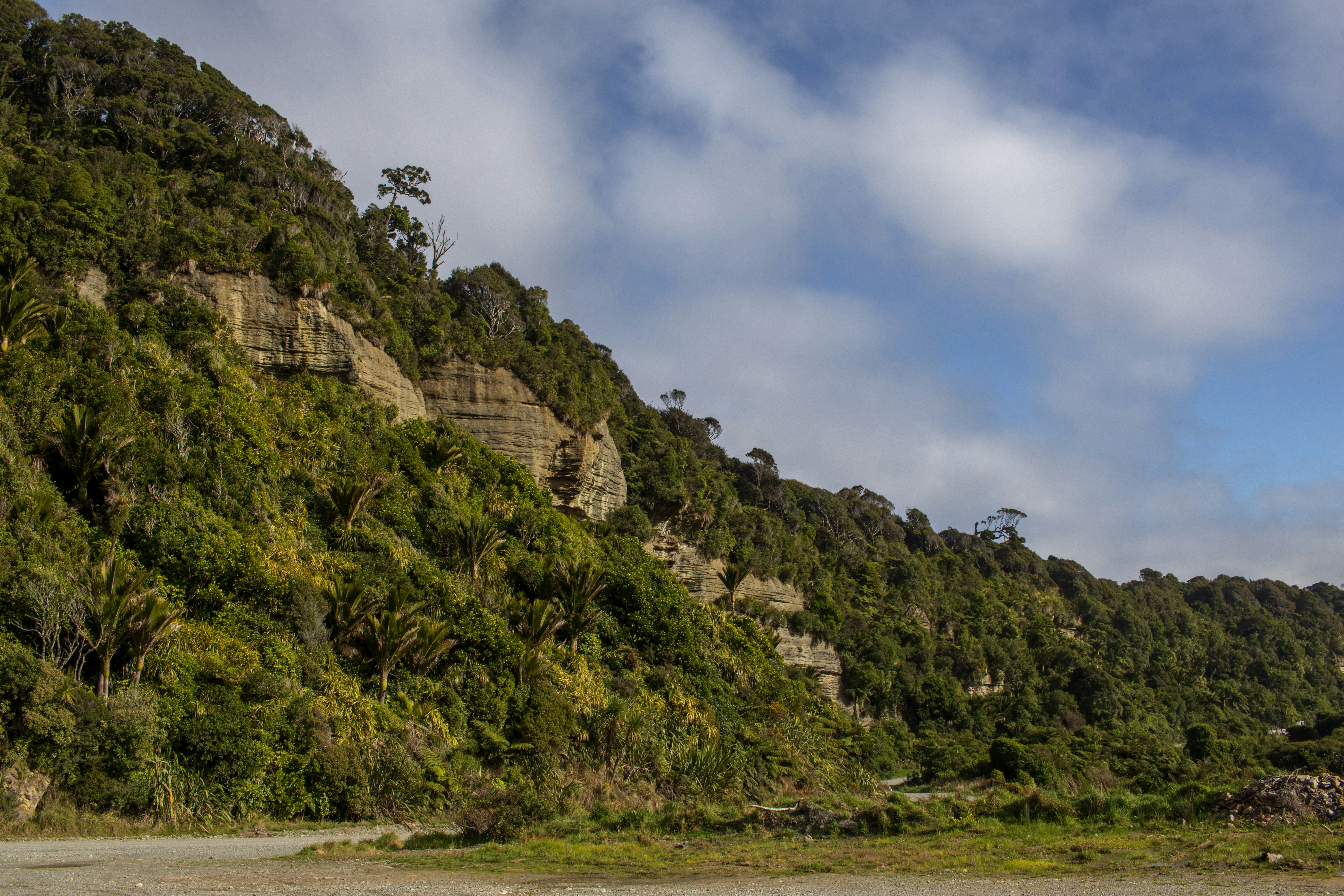 Rocky Coastal Cliffs Embracing a Quiet Shore