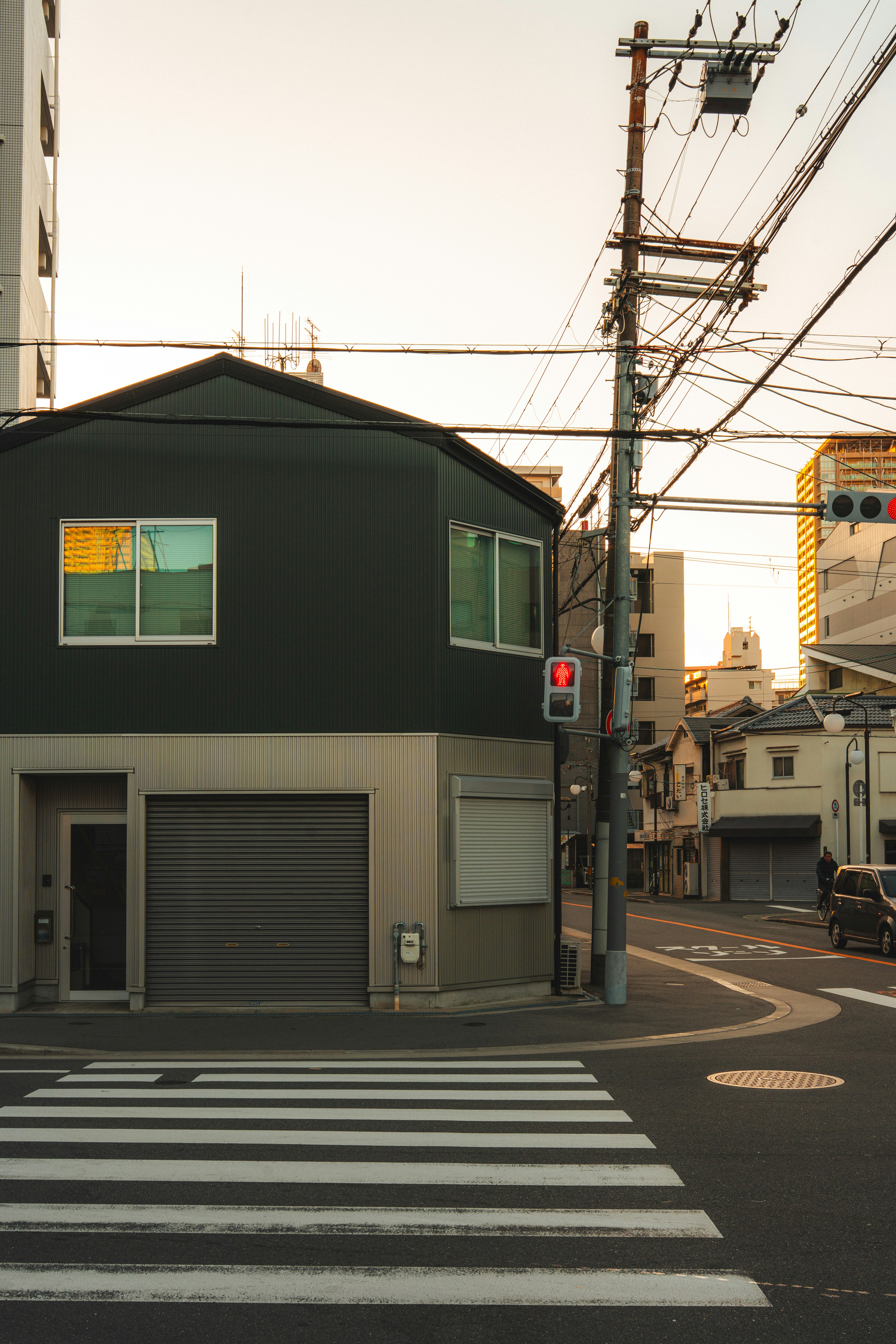 Urban Corner: Quiet Sunset Over a Two-Story Shopfront