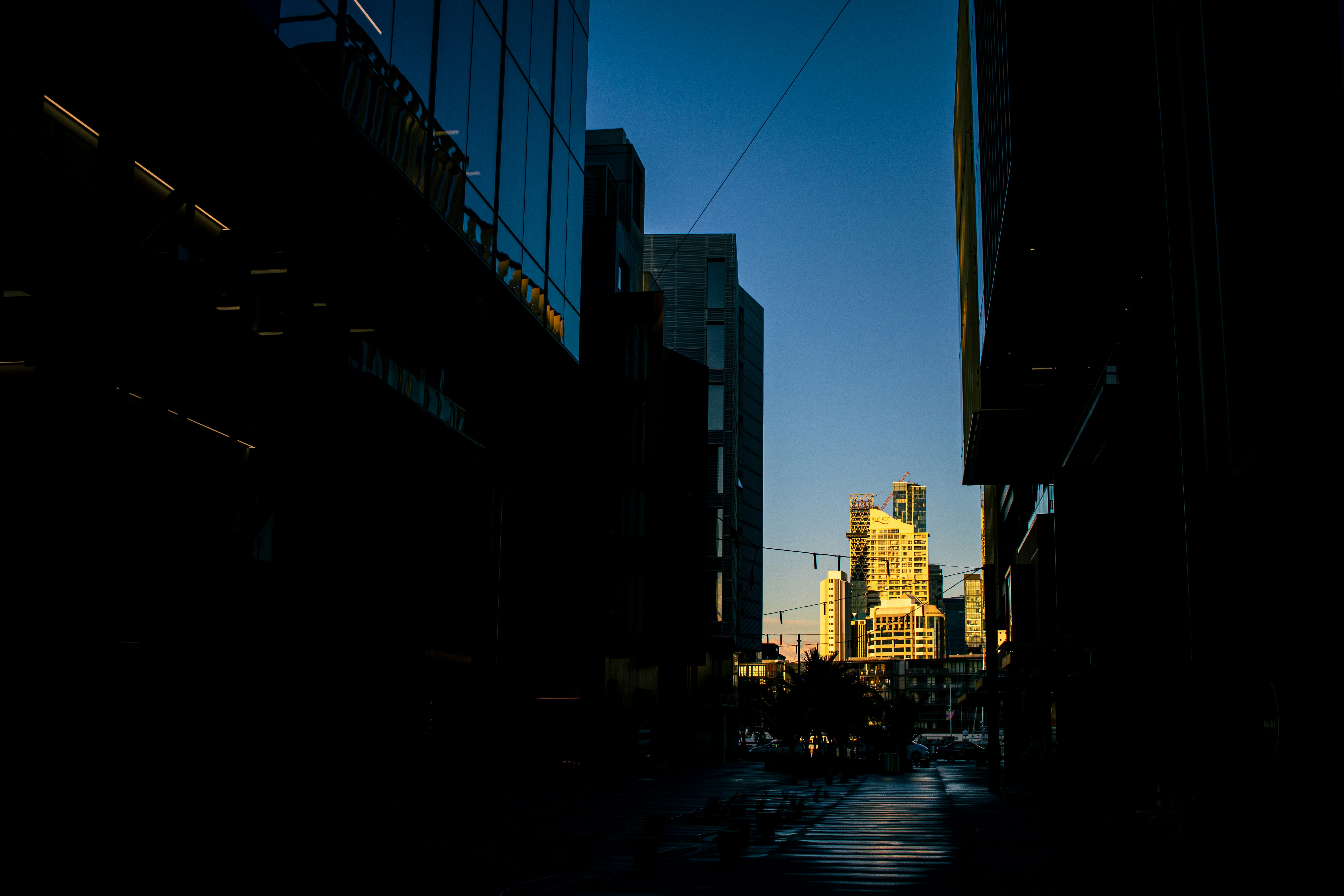 Dawn Breaks Over a Narrow City Canyon