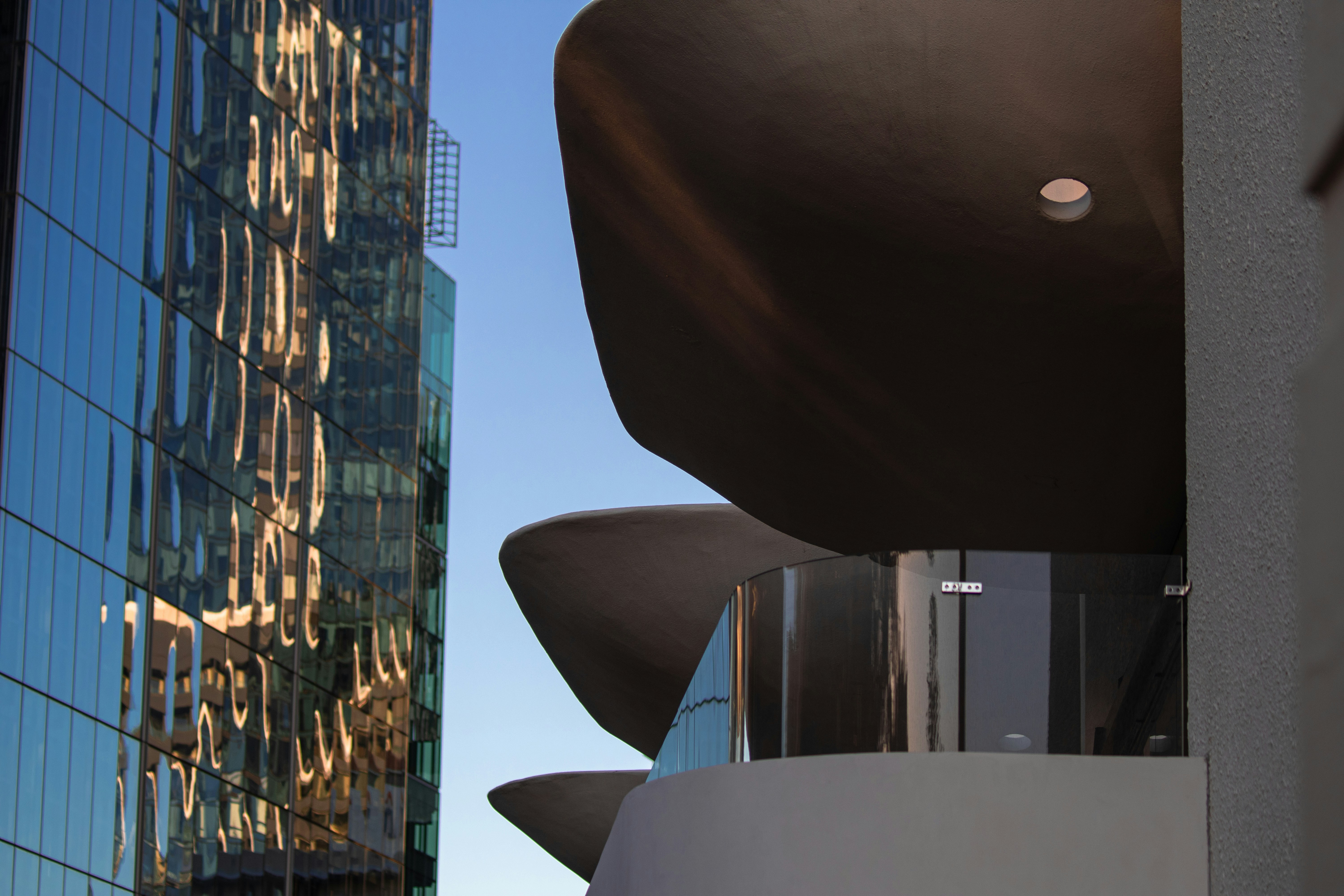 Glass Facade Reflections and Curved Architecture