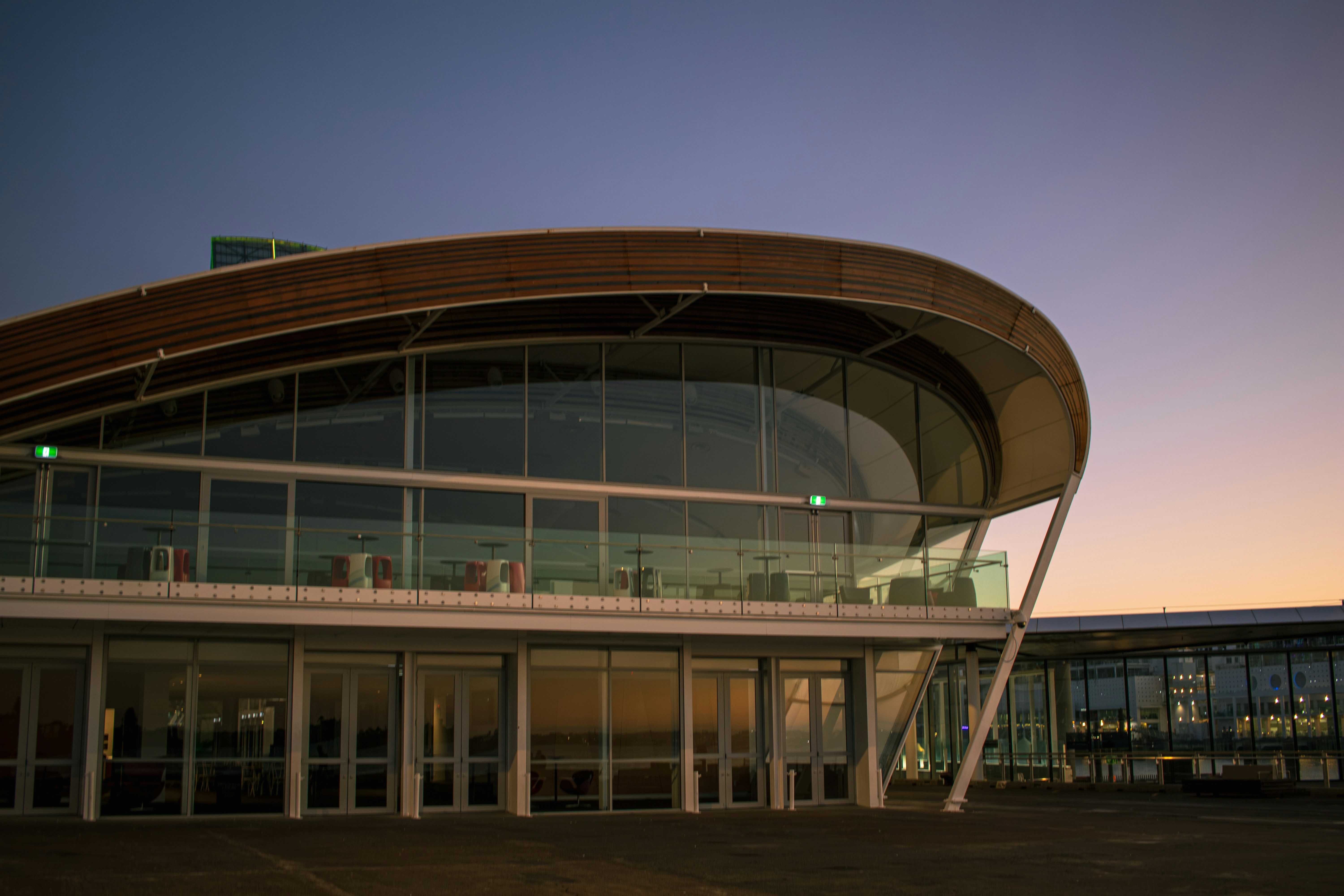 Curved Glass perch: the terminal’s sweeping balcony at blue hour