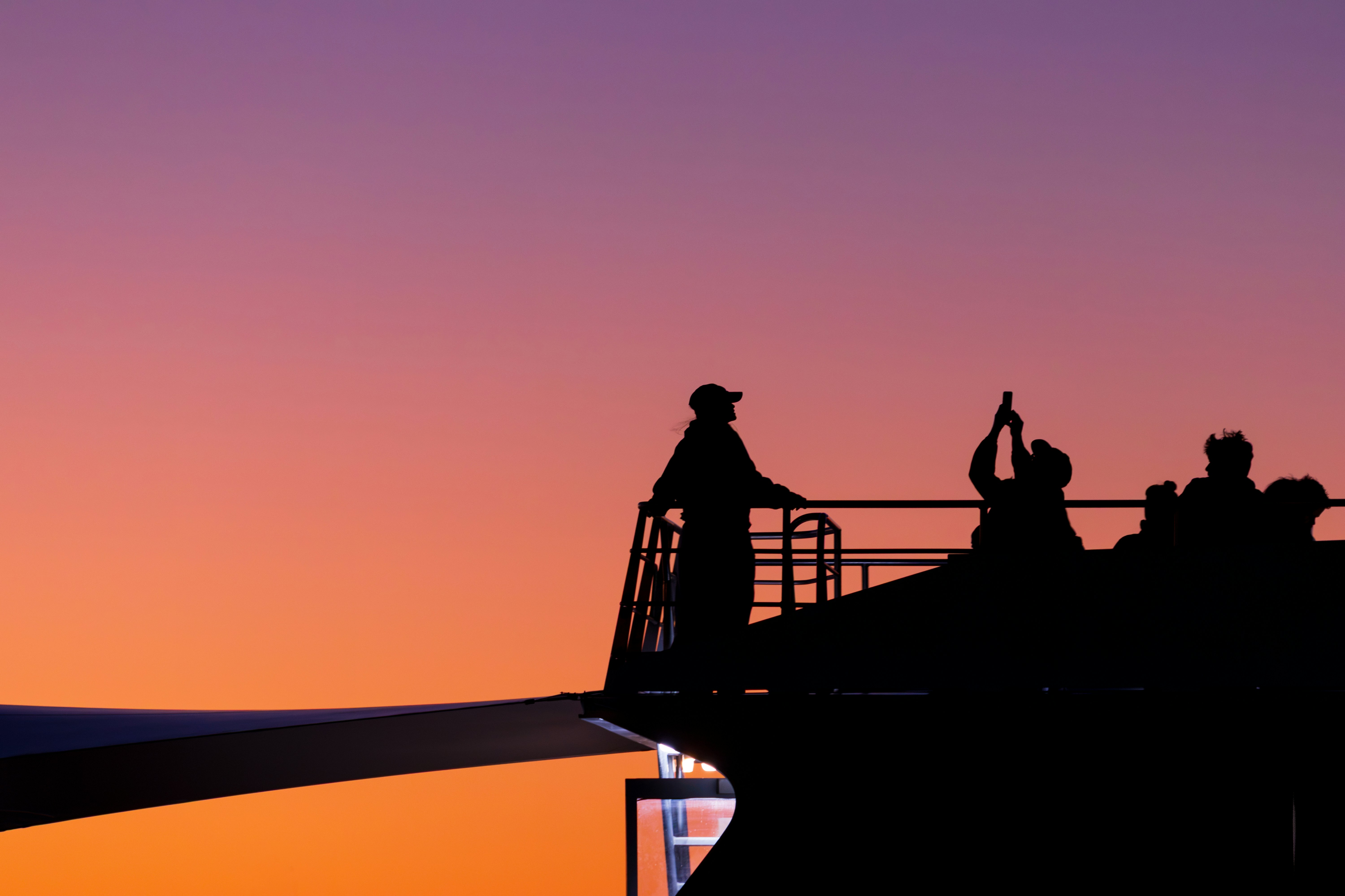 Silhouette at Sunset: A Structural Silhouette Over a Carriage Platform
