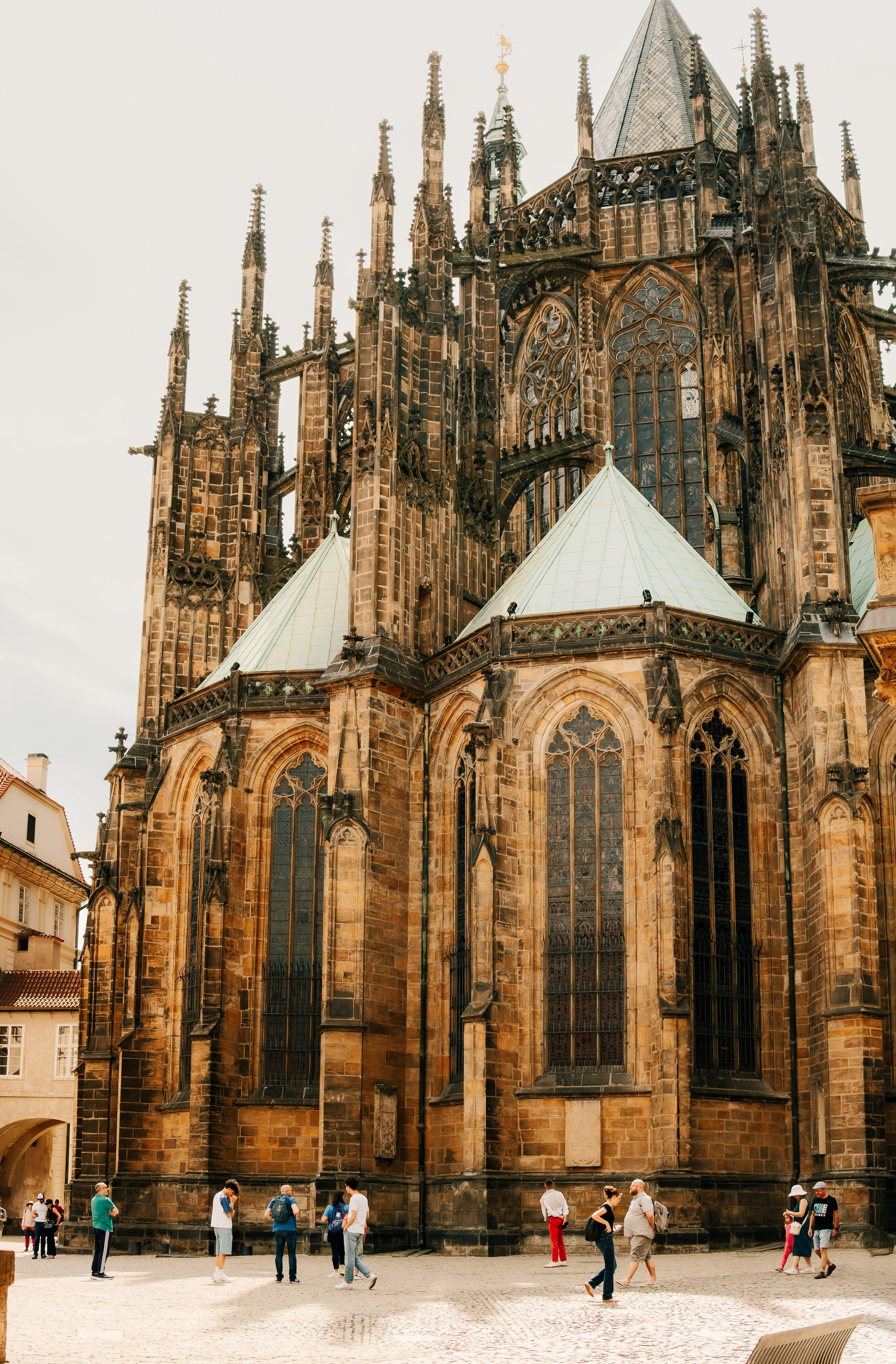 Gothic Cathedral Facade: Sunrise in Stone with Courtyard Crowd