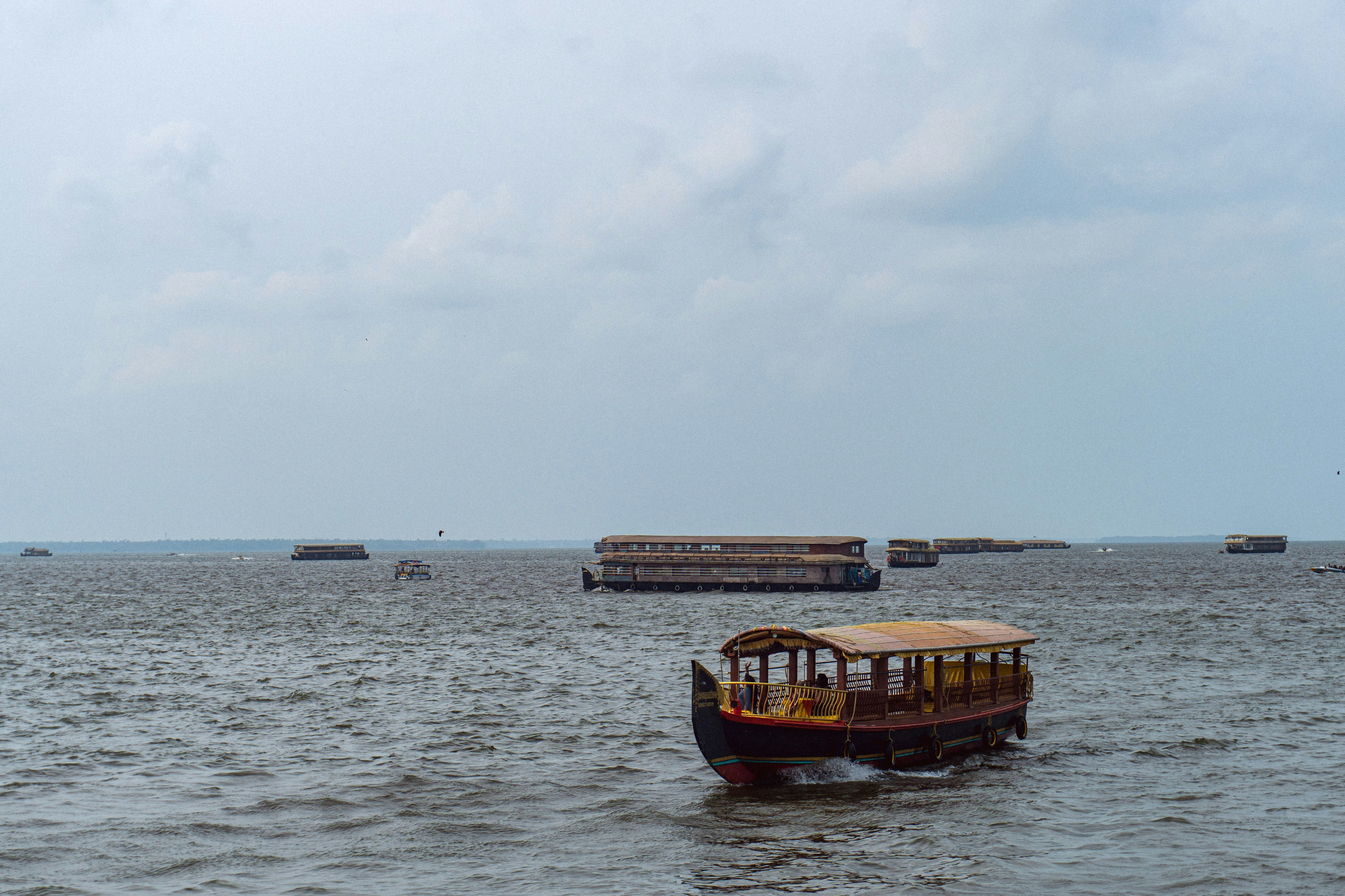 Boat Under a Quiet Sea: A Cargo Vessel Poised on Calm Waters