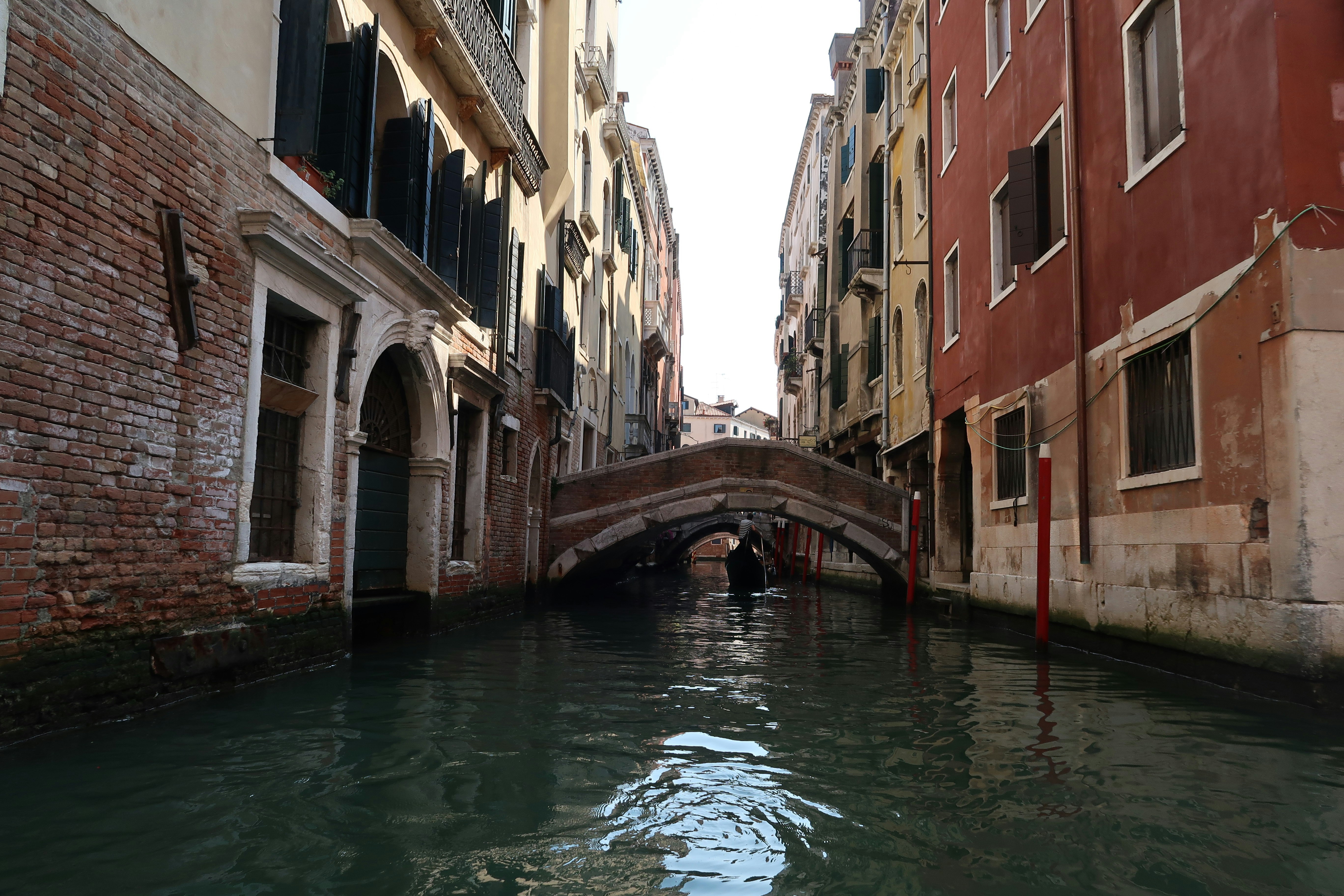 Canal Venture: Evening Light Over a Venetian Waterway