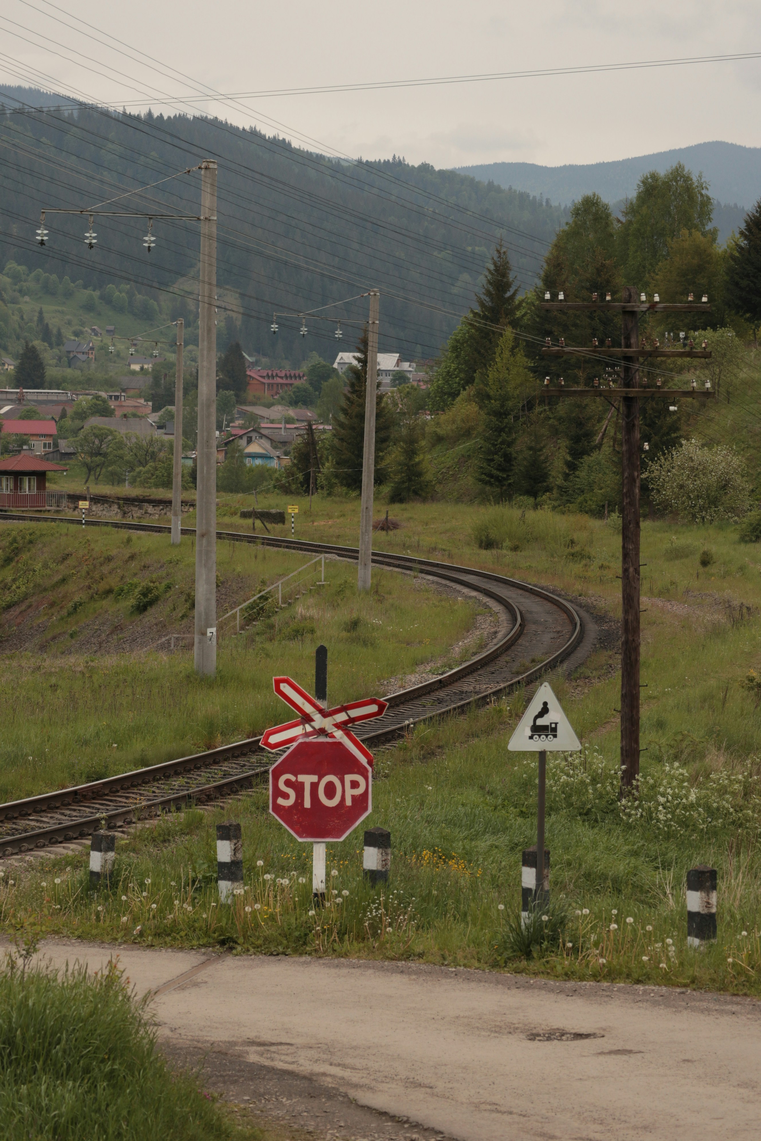 Railway Crossing at the Edge of a Quiet Town