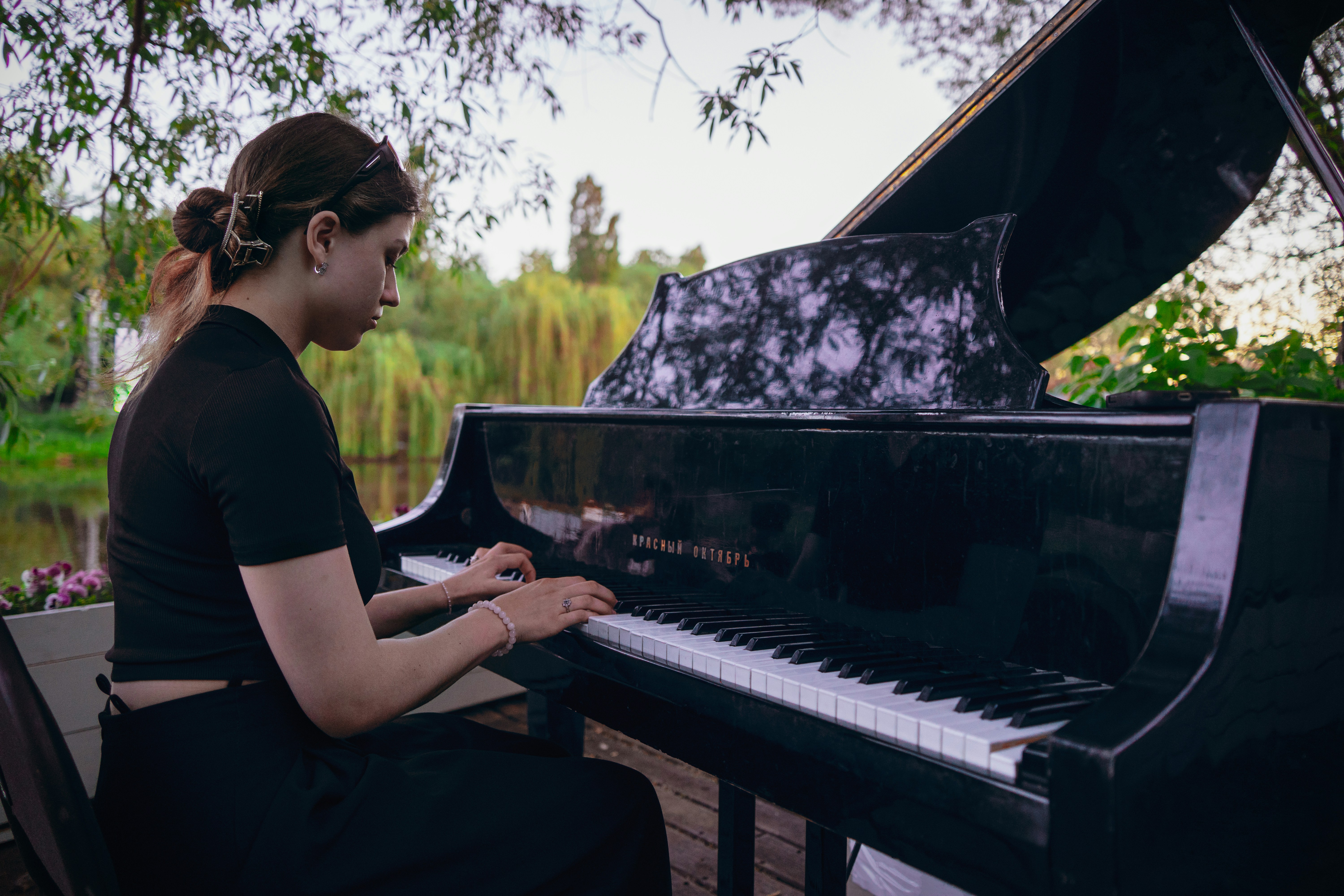 Serene Piano Portrait Under Dappled Evening Light