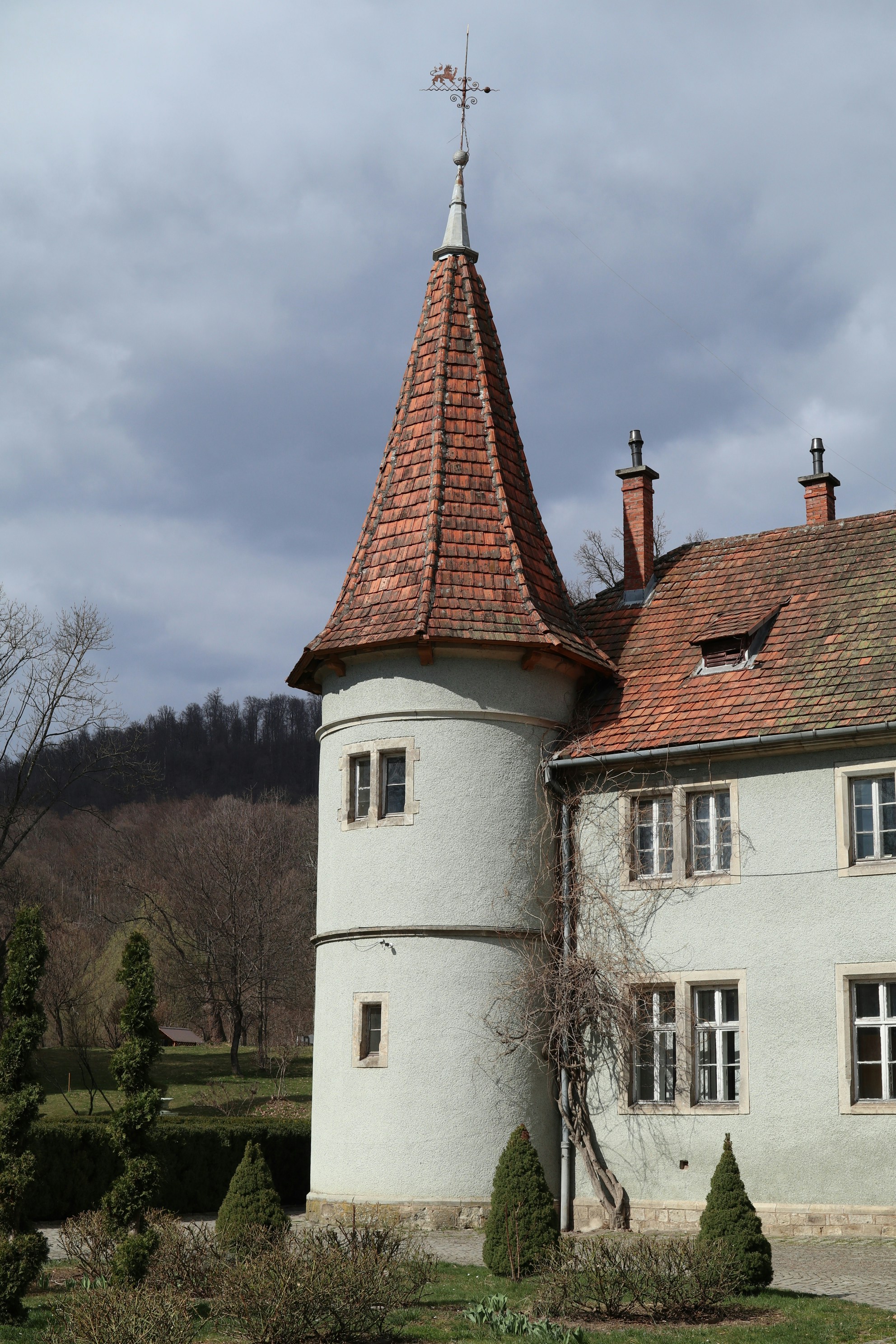 Turreted Manor under a Cloudy Sky