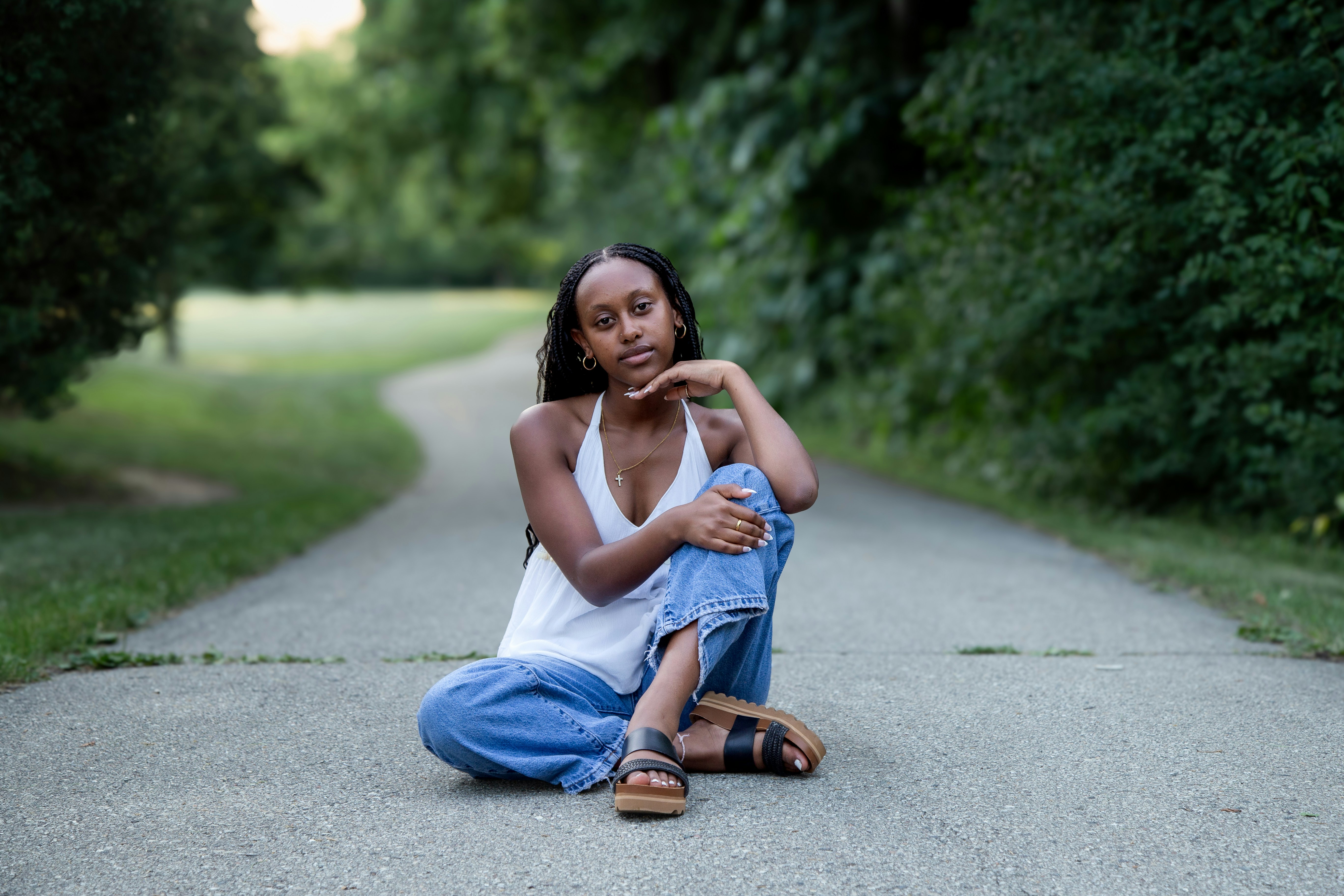 Stillness on the Road: A Quiet Portrait in Dappled Light