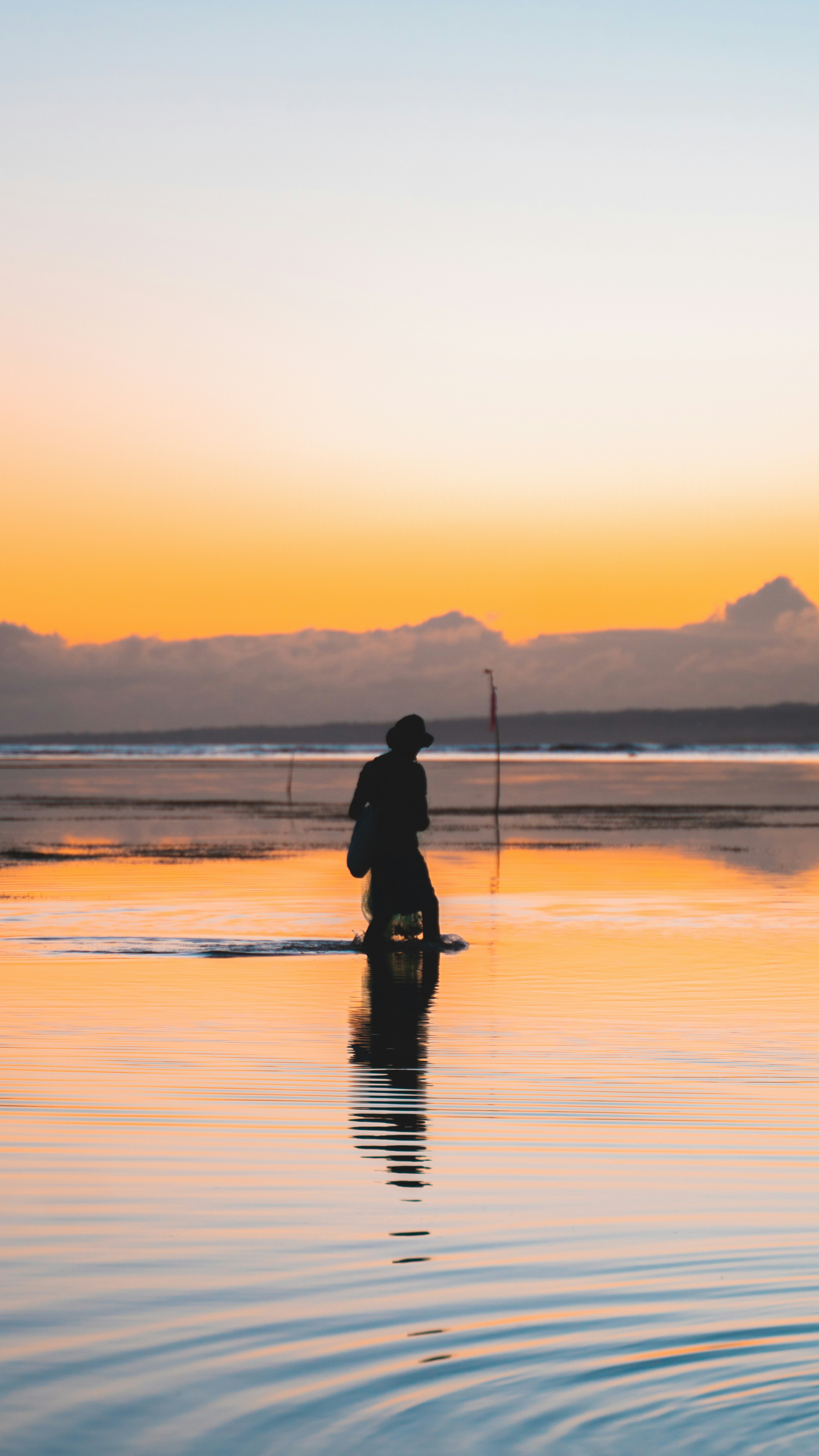 Silhouette in Sunset Tides