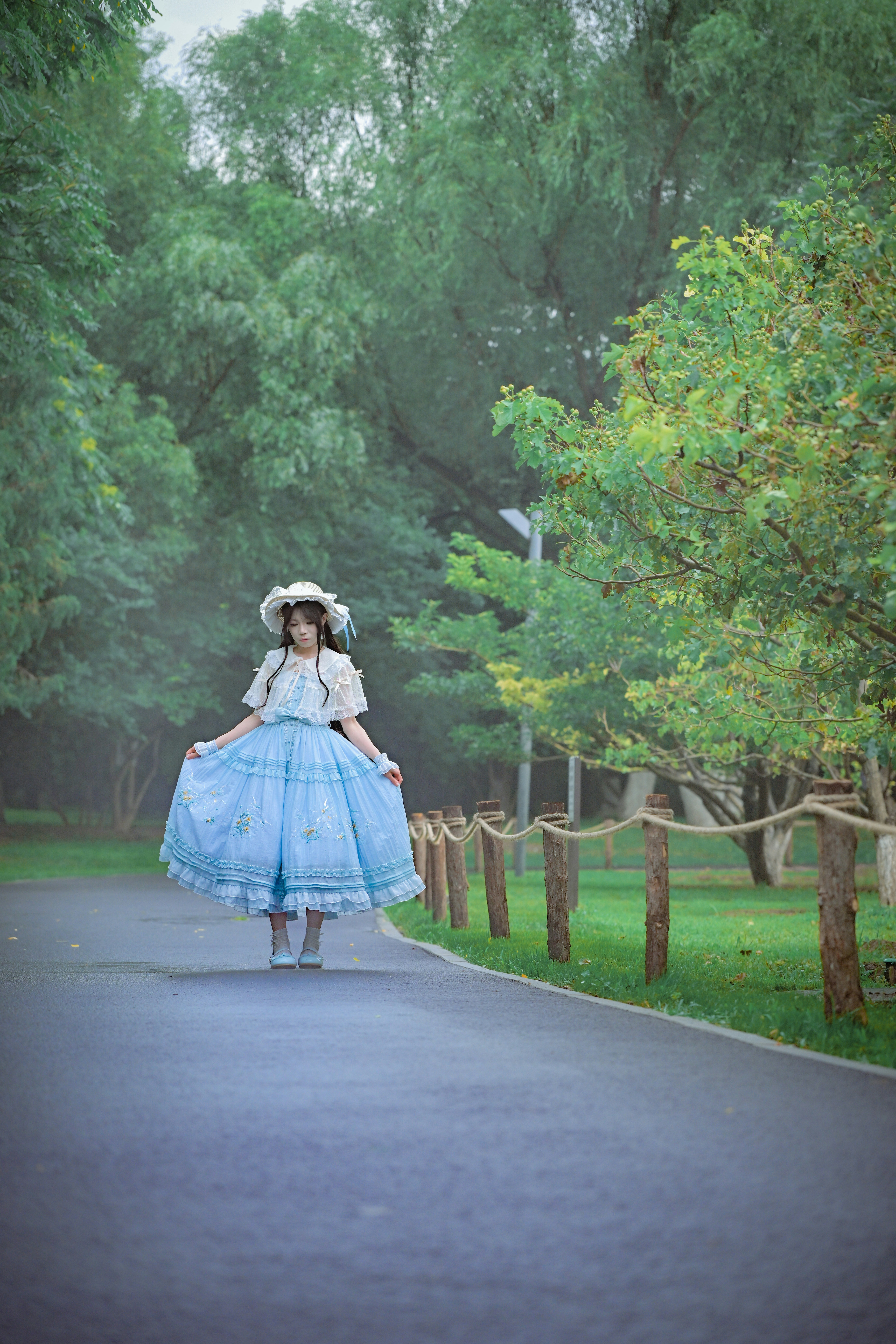 The Blue Dress on a Quiet Park Path