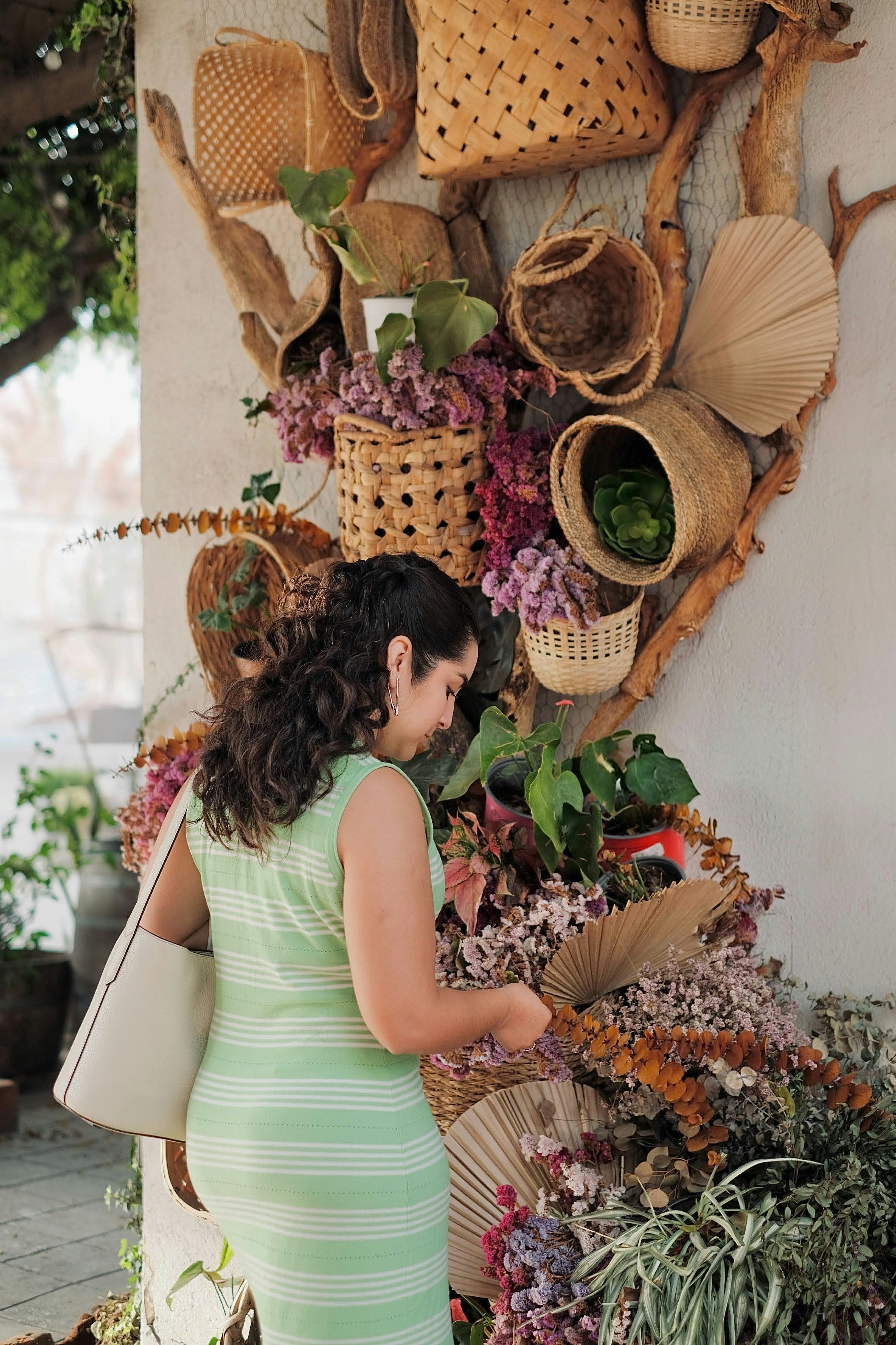 Green‑Striped Dress, Quiet Moment Amid Woven Blooms