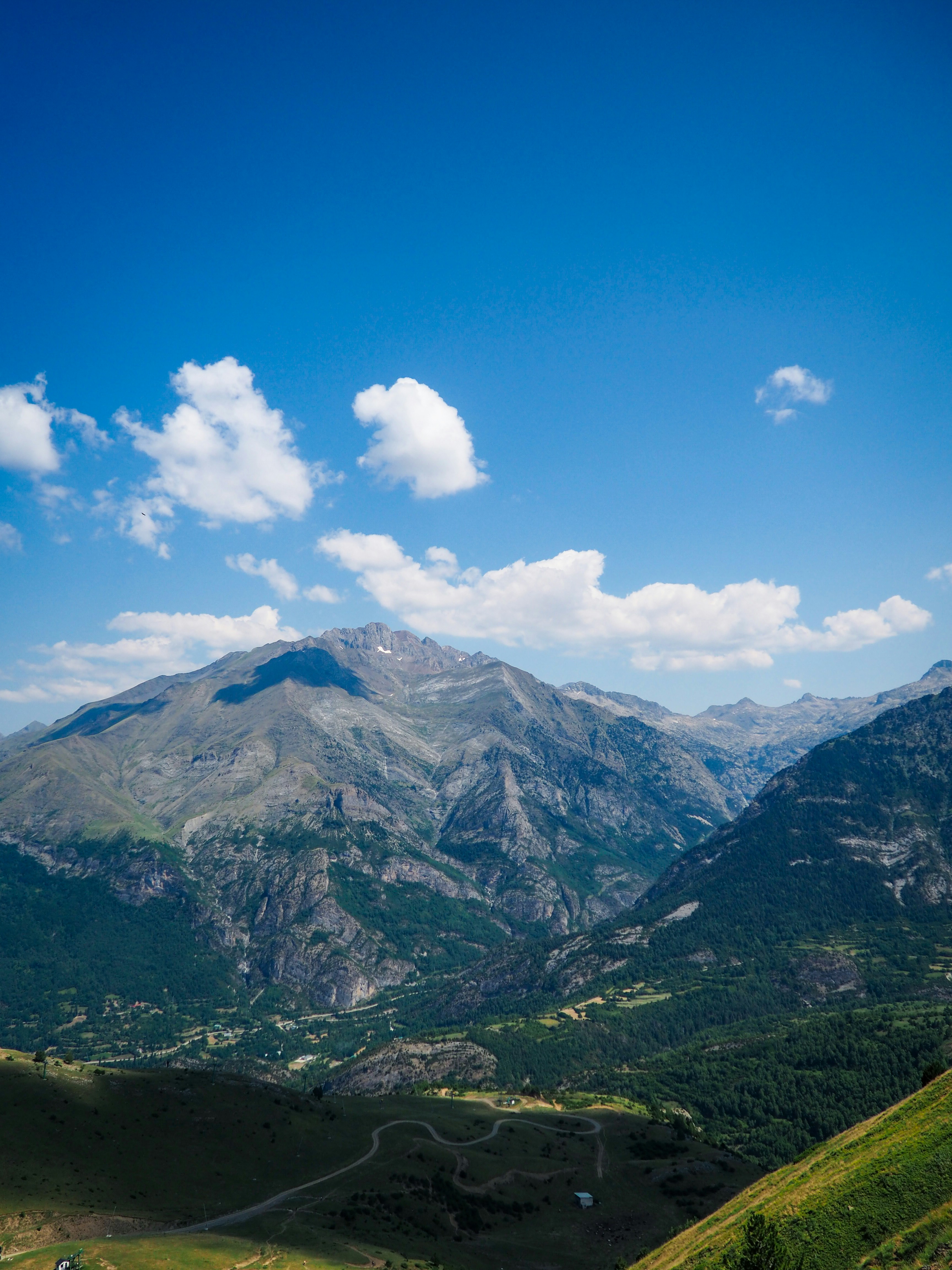 Aegean Blue: Mountain Ridge Under a Vast Sky